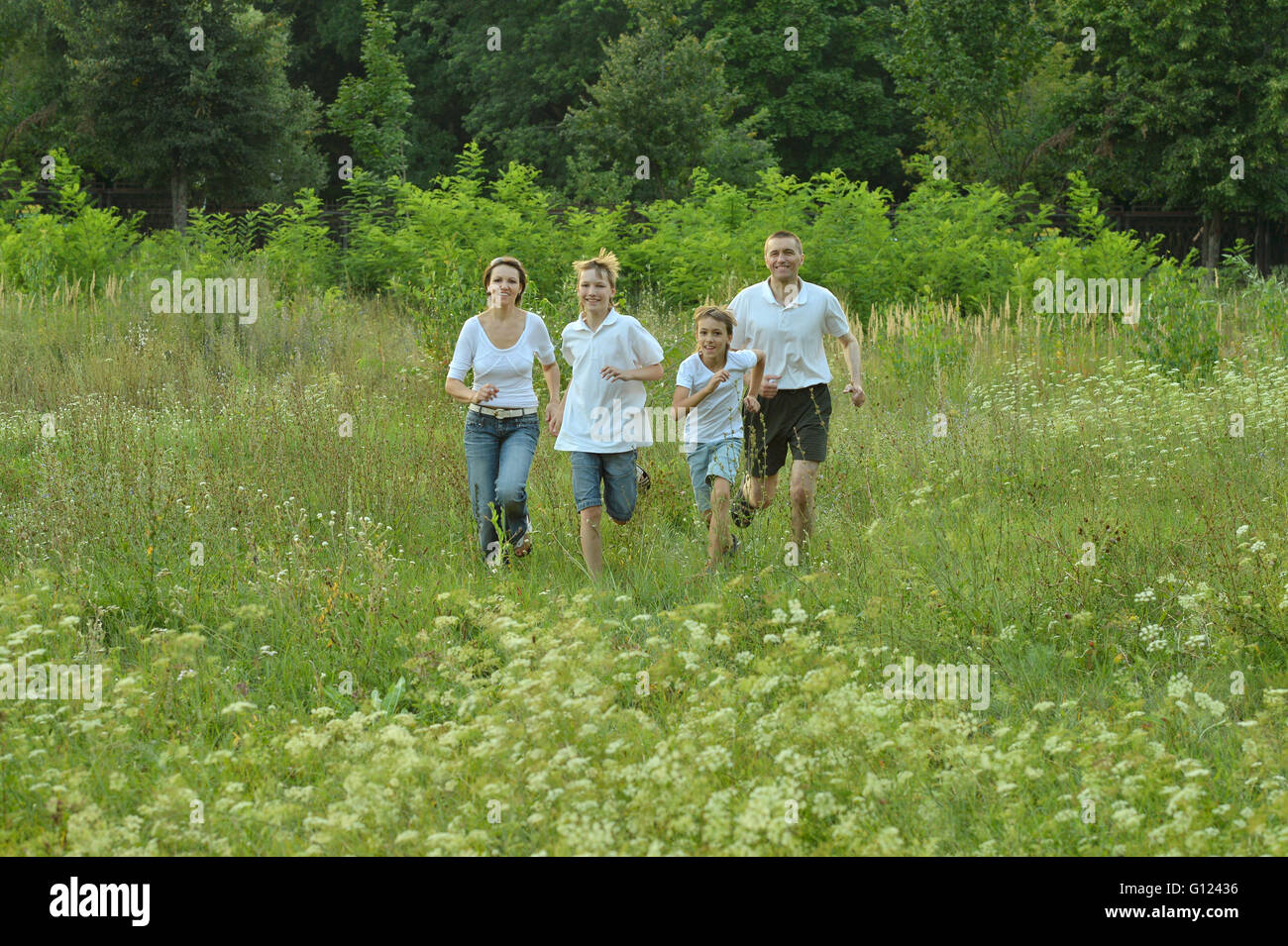 Family of four Stock Photo - Alamy
