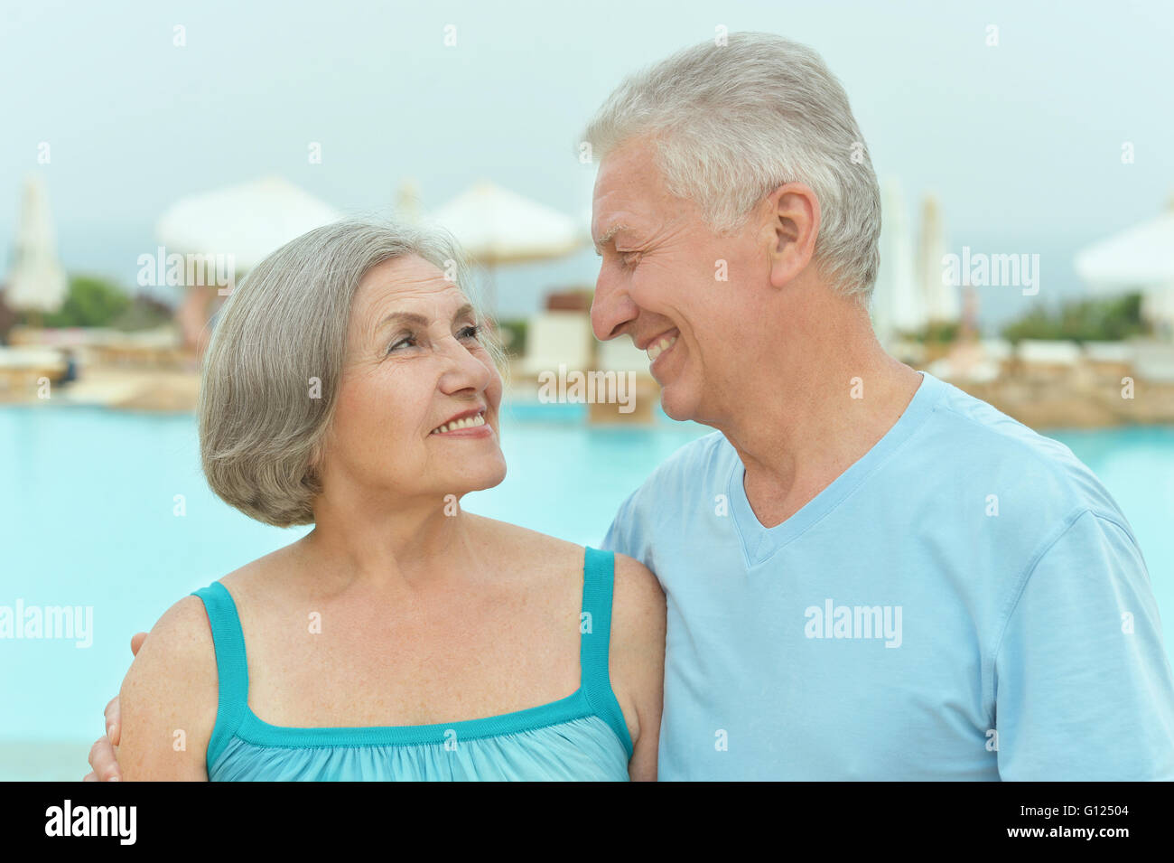 couple near pool Stock Photo - Alamy