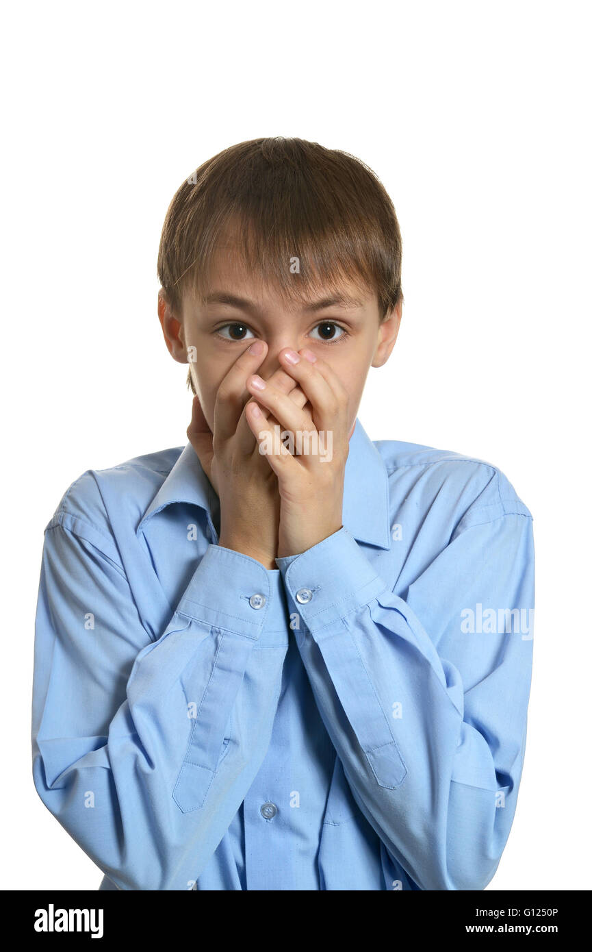 Surprised young boy isolated Stock Photo - Alamy