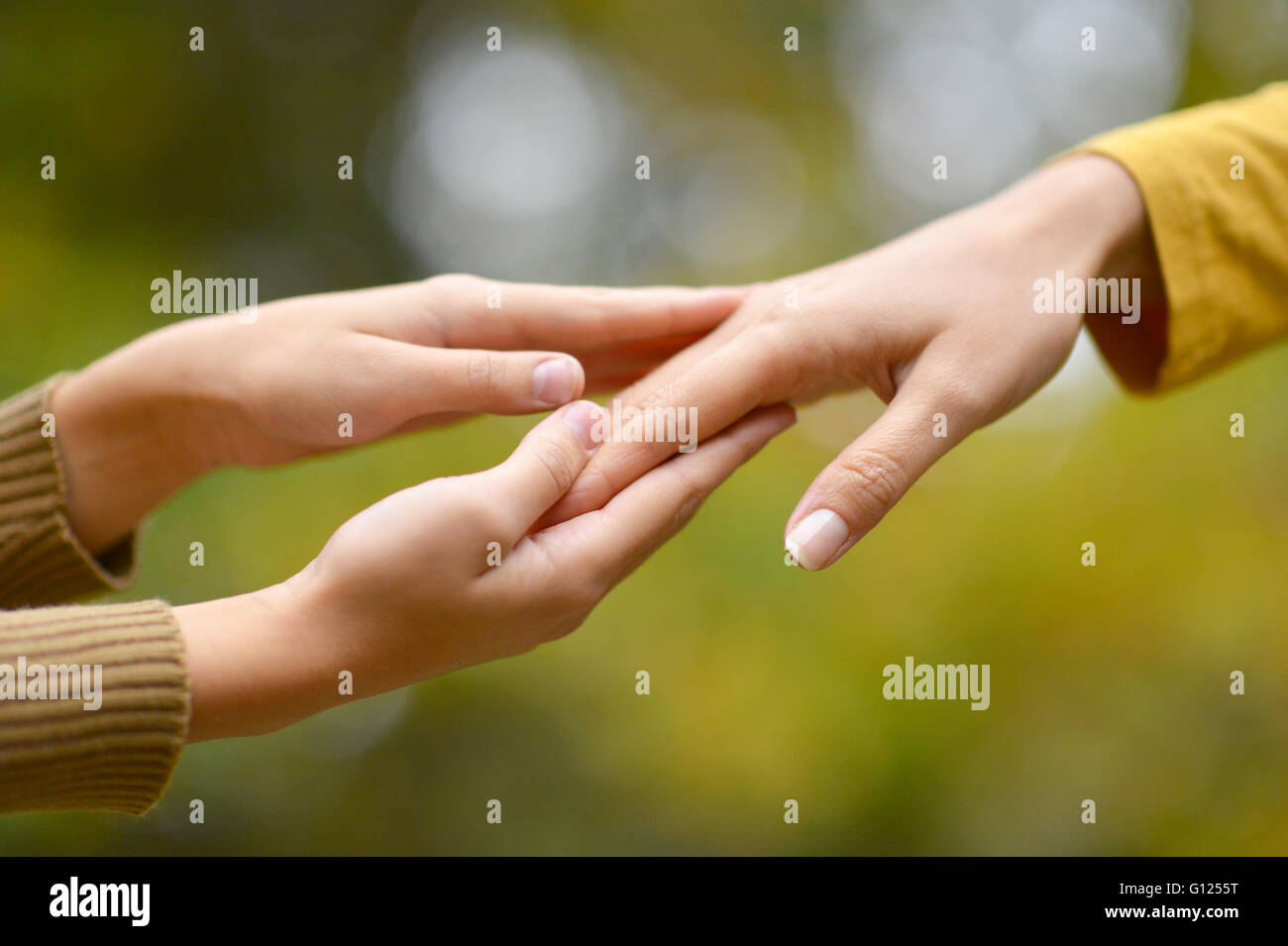 Two hands together Stock Photo - Alamy