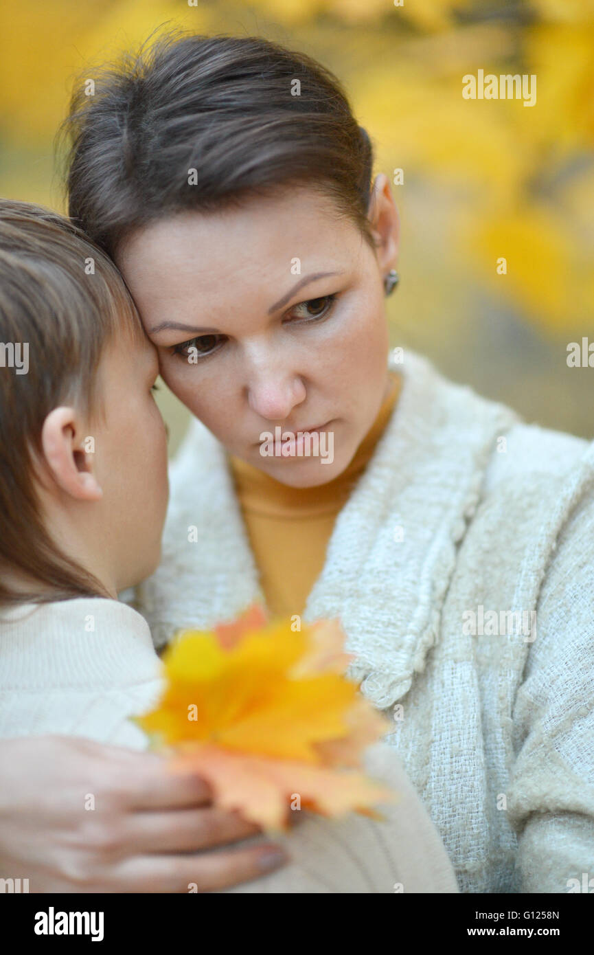 Sad mother with a son Stock Photo - Alamy