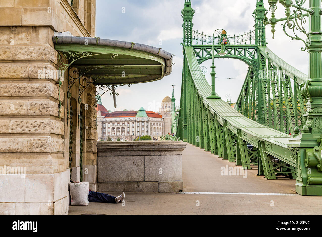 a homeless man near the green Liberty Bridge in Budapest, Hungary Stock ...