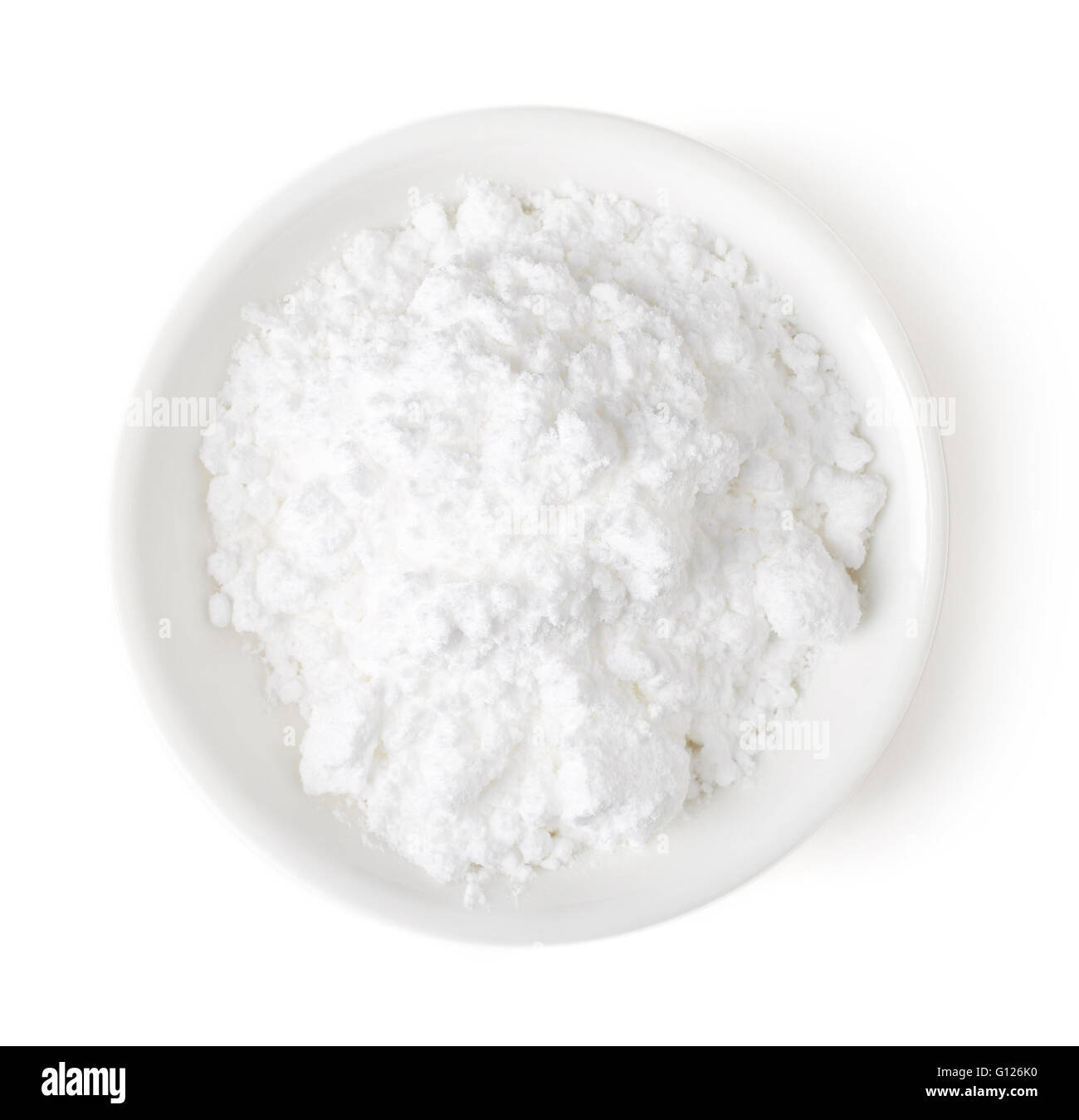 Bowl of powder sugar isolated on white background, top view Stock Photo ...