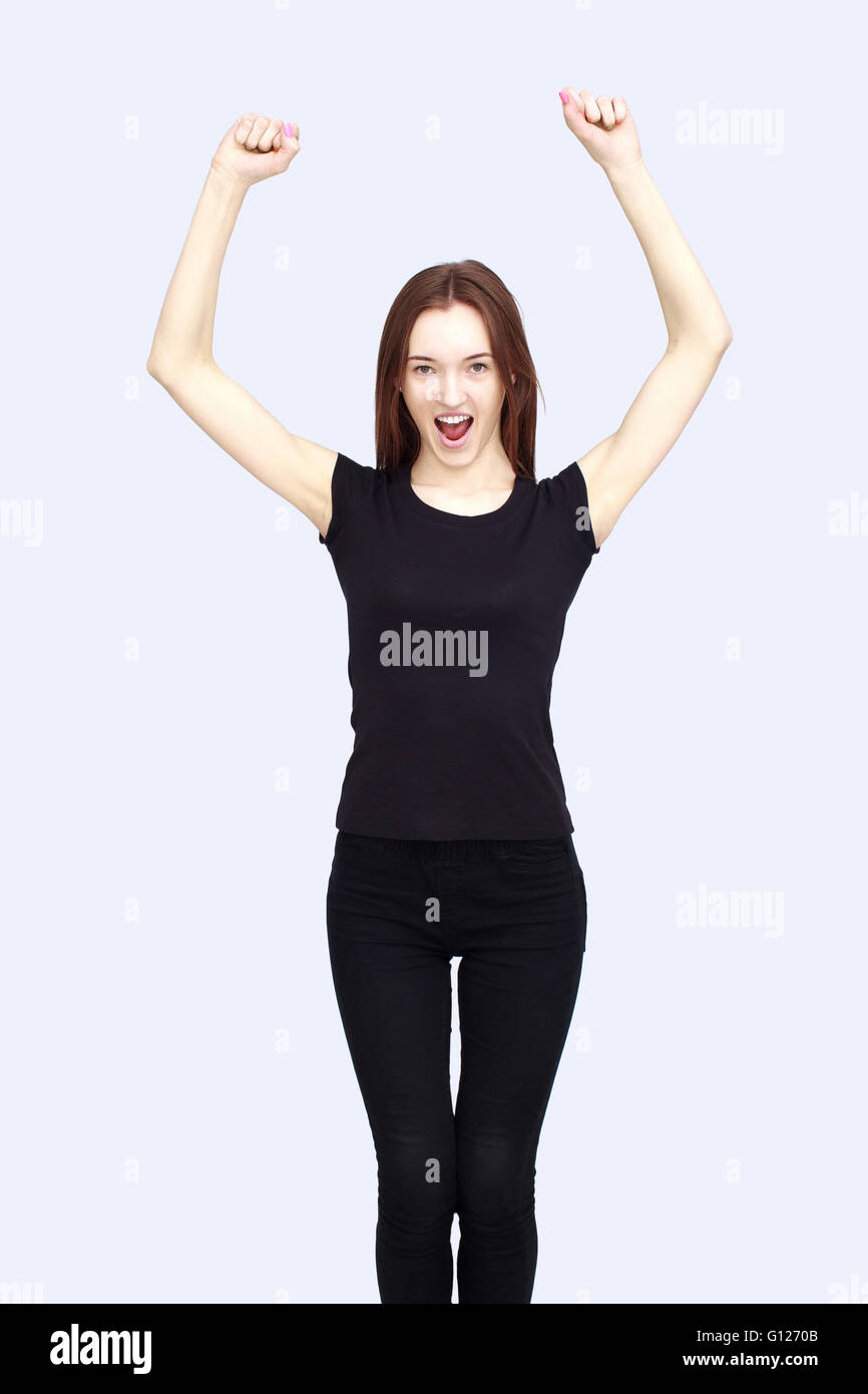 portrait of happy woman in black celebrating victory Stock Photo - Alamy