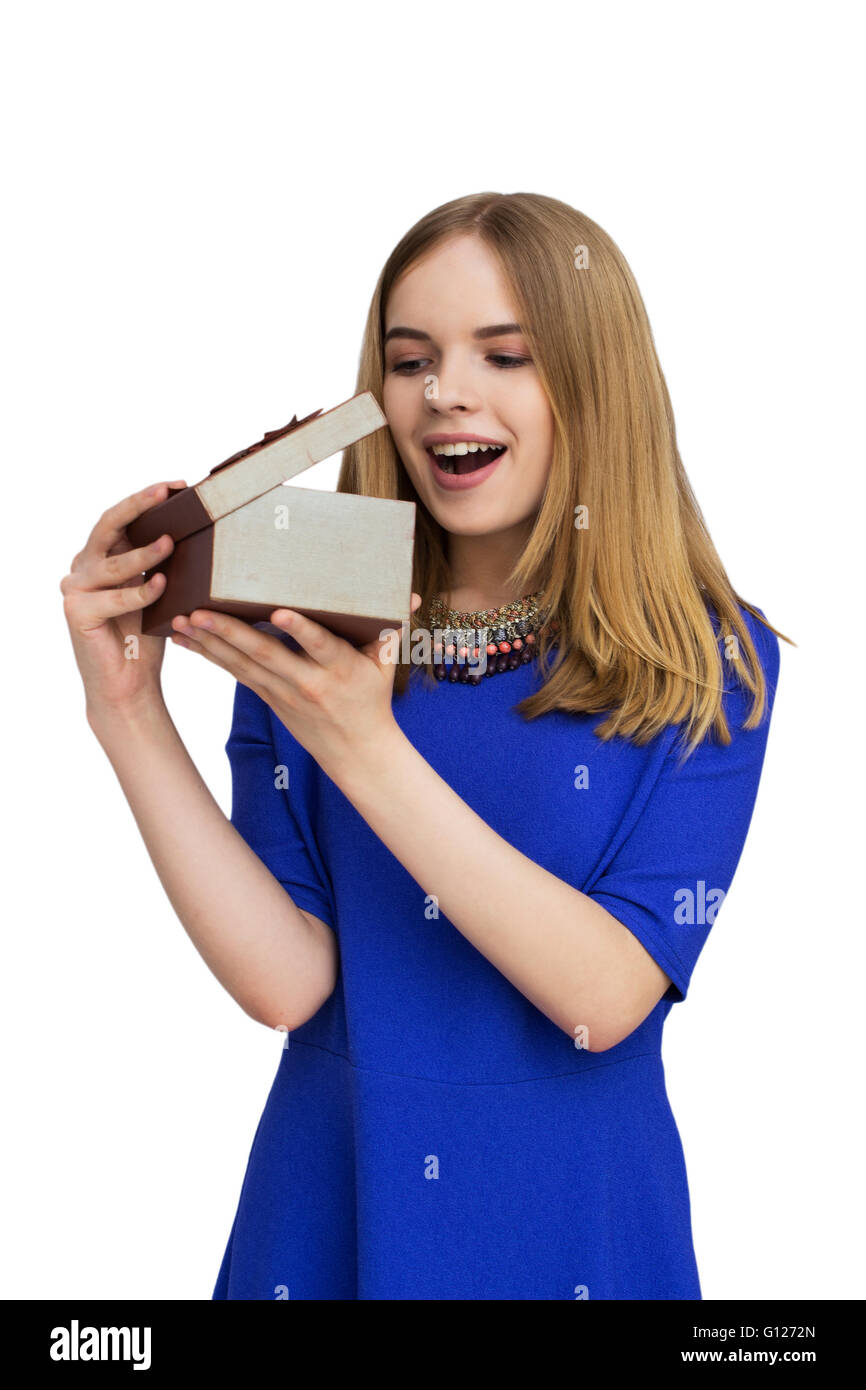 Portrait of woman in blue dress exciting from present Stock Photo - Alamy