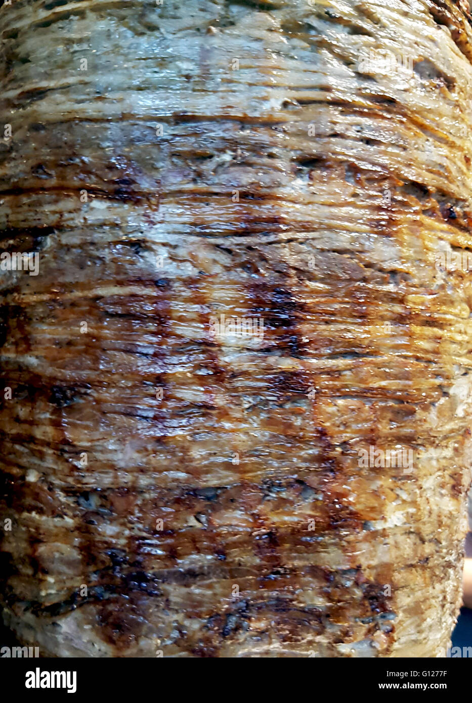 Grilled meat for kebab background texture Stock Photo - Alamy