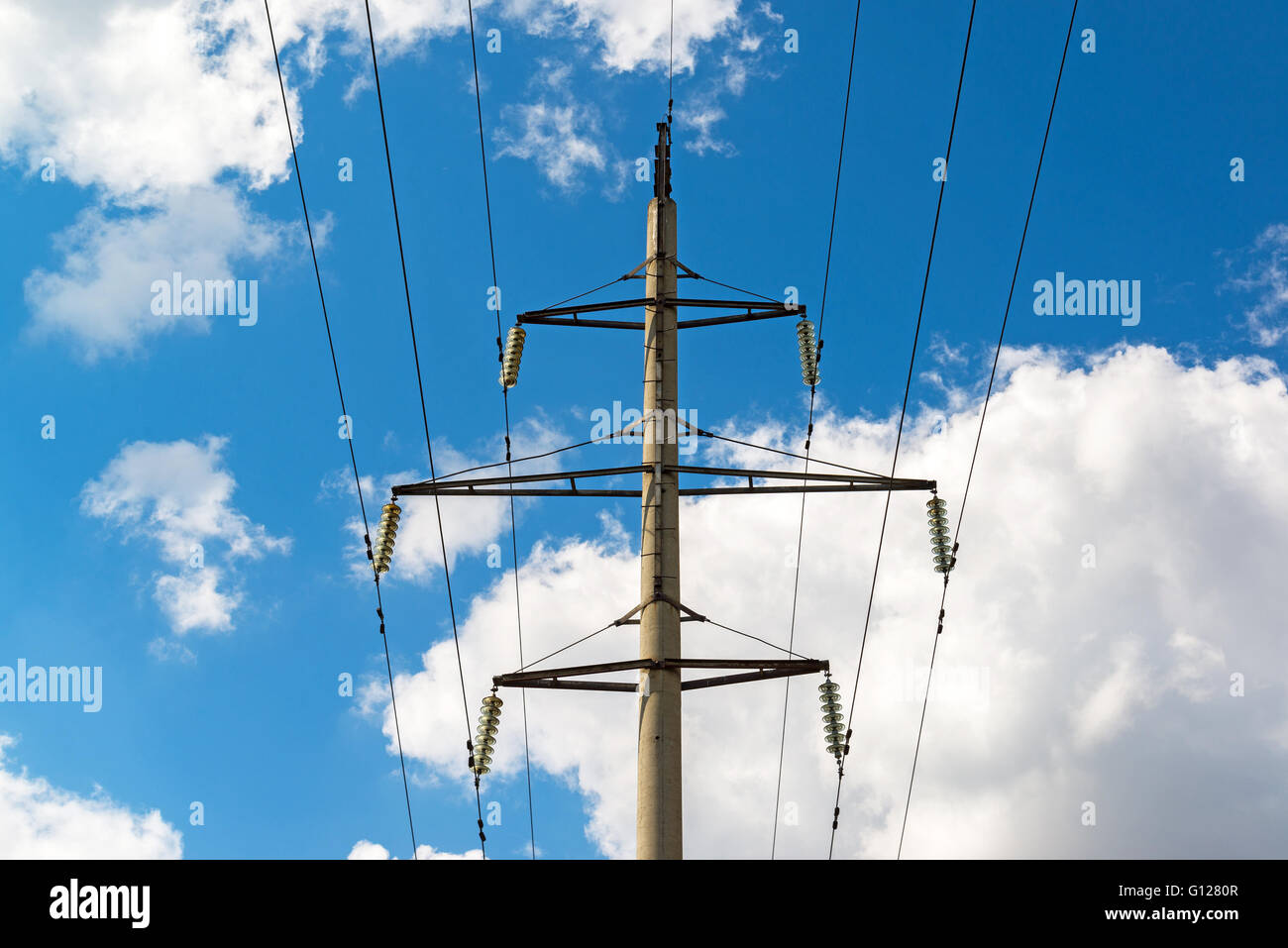 High-voltage power line on sky background Stock Photo - Alamy