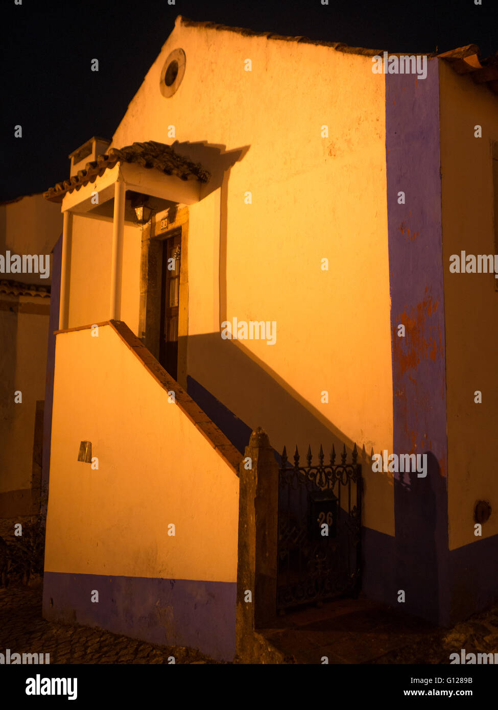 Traditional house night shot Stock Photo - Alamy
