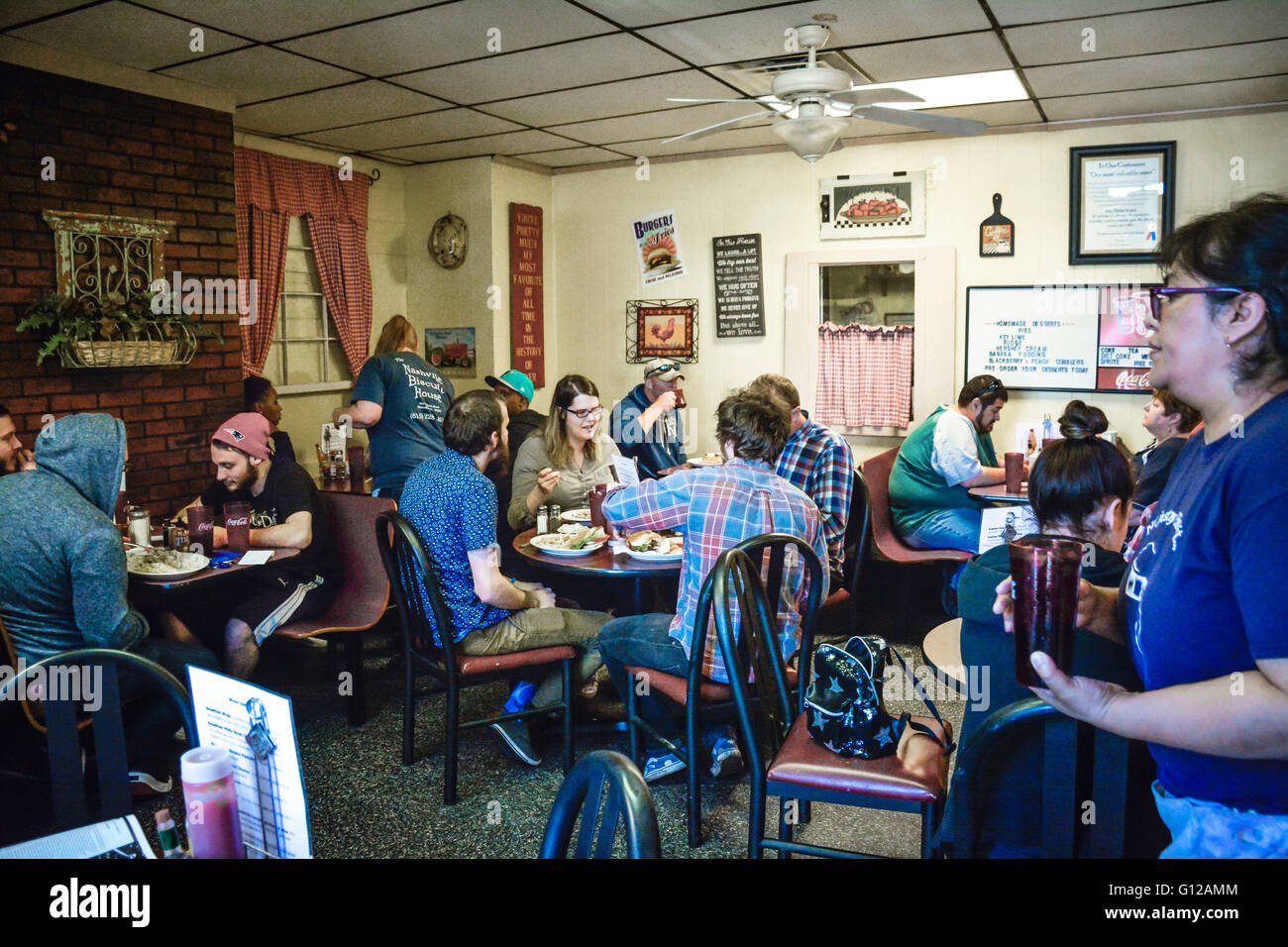 Waitresses are kept busy with the lively hipster patrons at The ...