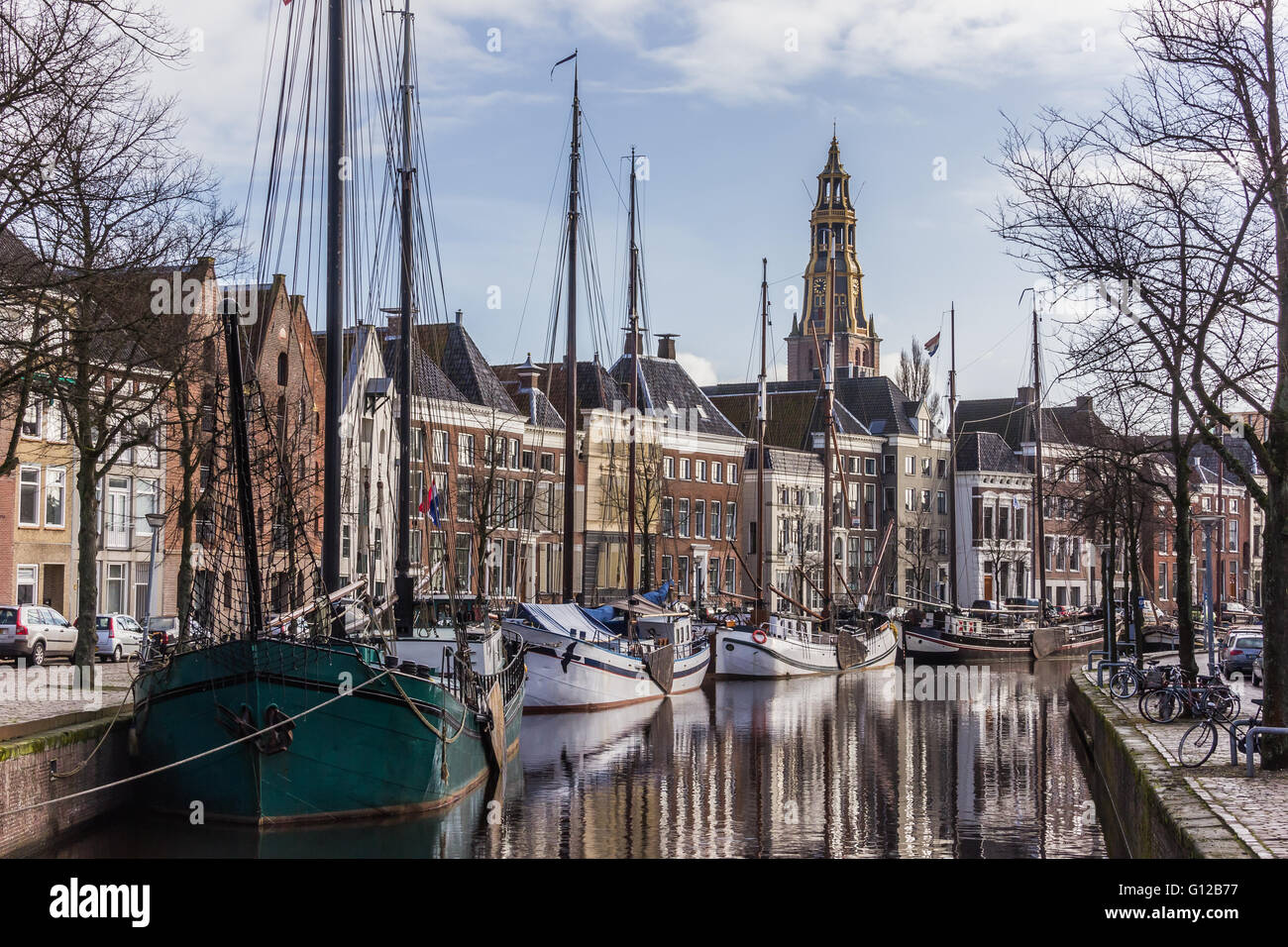 Old ships and warehouses in the center of Groningen, the Netherlands ...