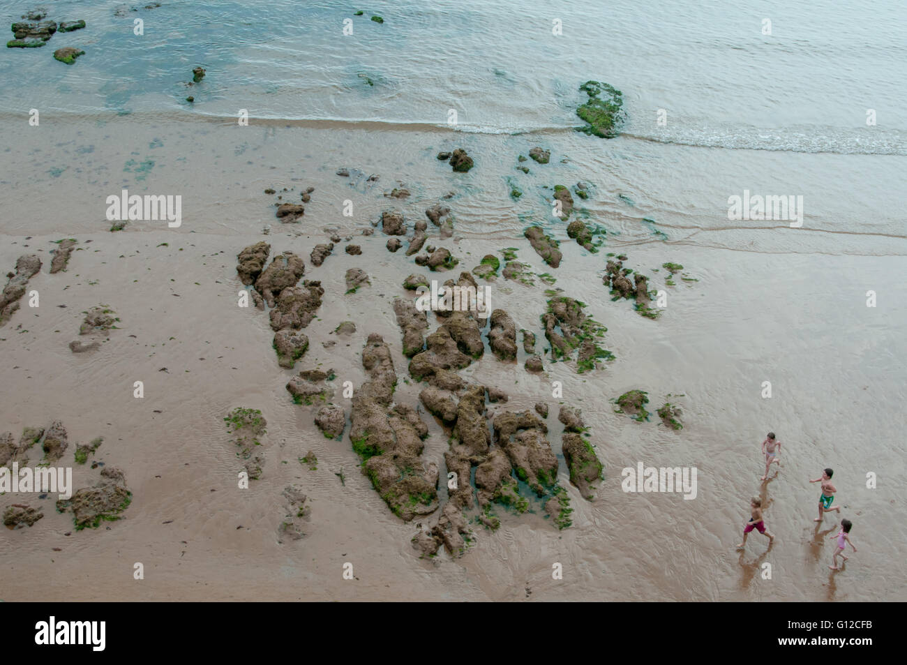 rocks on beach Stock Photo - Alamy