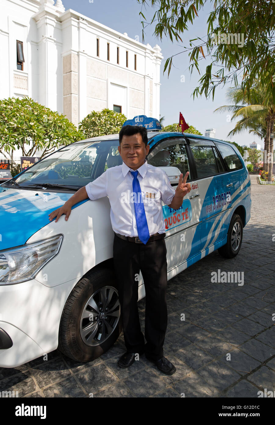 Blue and white taxi in Nha Trang Vietnam Stock Photo - Alamy