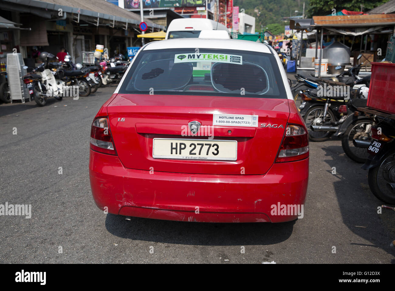 Traditional red and white taxi parked in Penang Malaysia Stock Photo ...