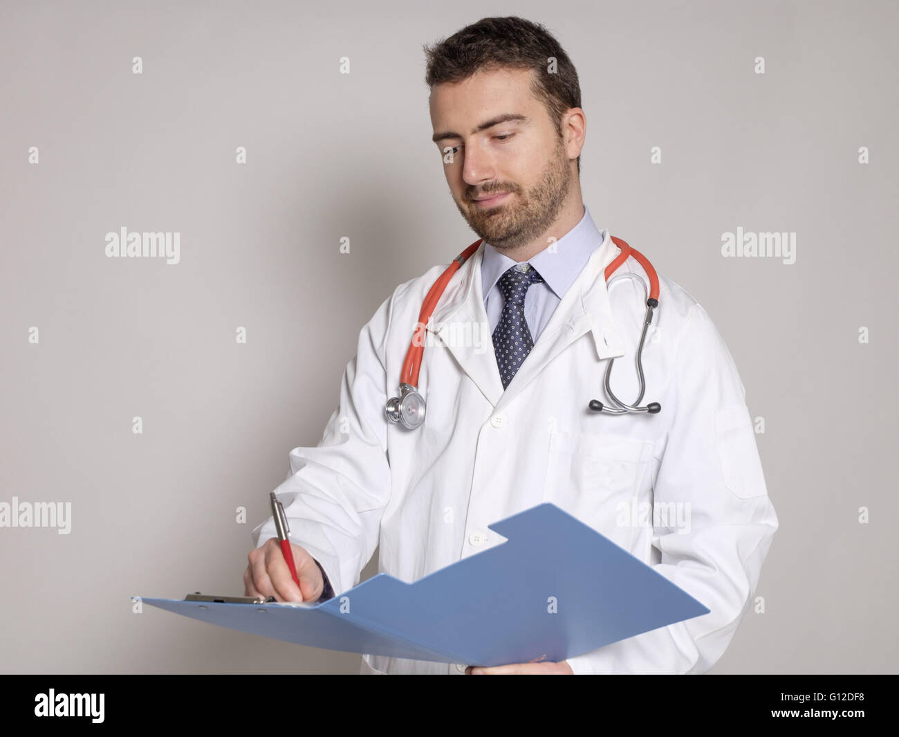 doctor isolated on gray background Stock Photo - Alamy