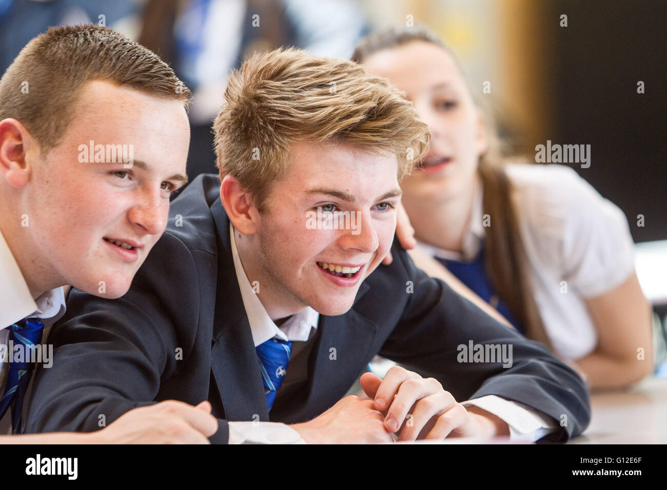 `School children enjoying lessons and studying Stock Photo - Alamy