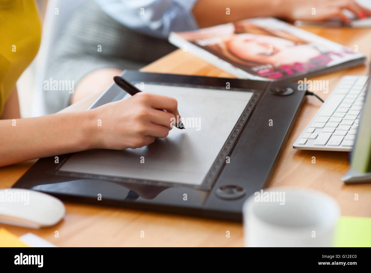 Pleasant person making notes Stock Photo - Alamy