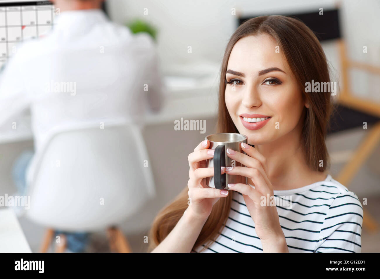 Magnetic woman resting in the office Stock Photo - Alamy