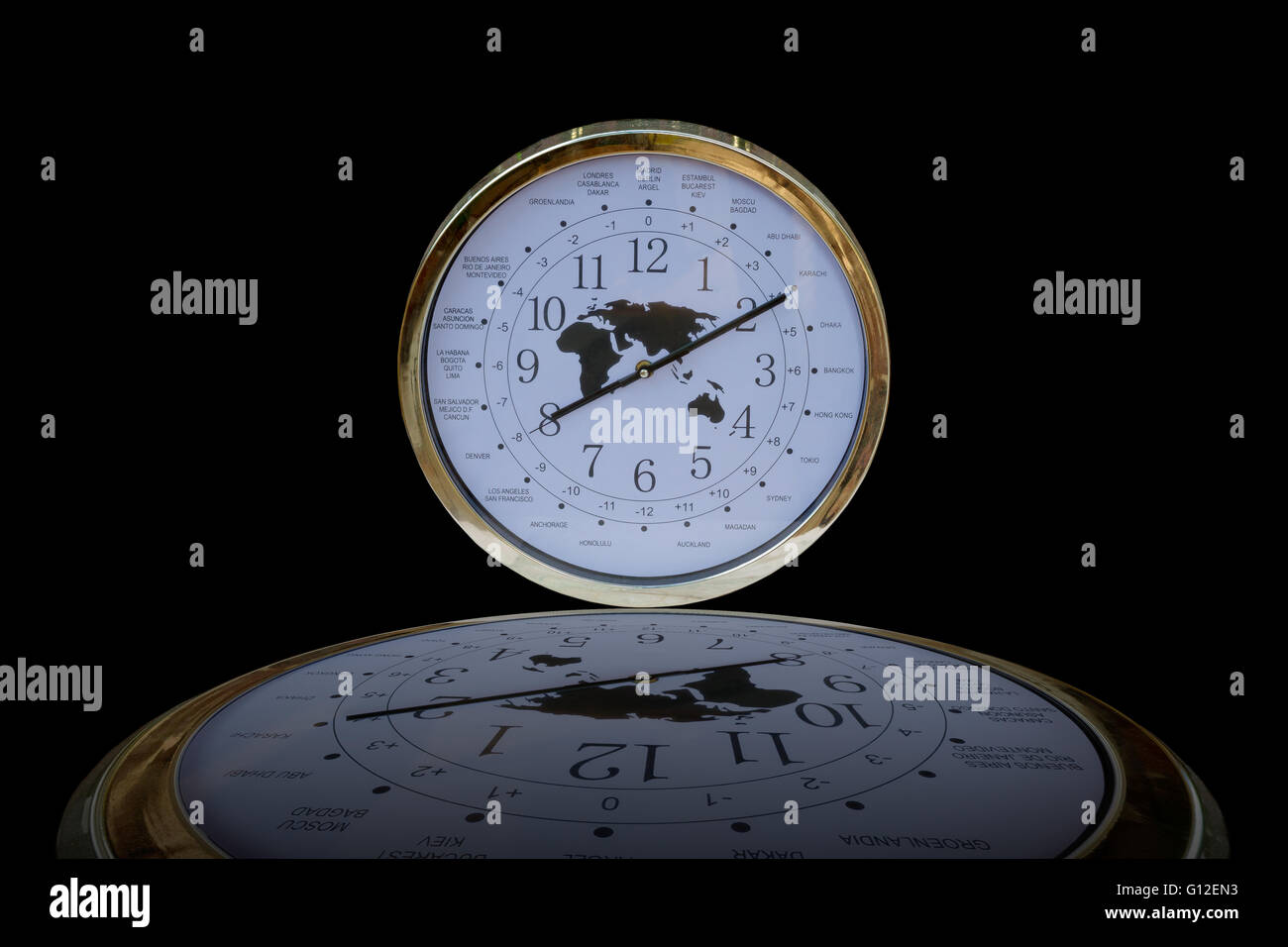 Clock on black background Stock Photo - Alamy