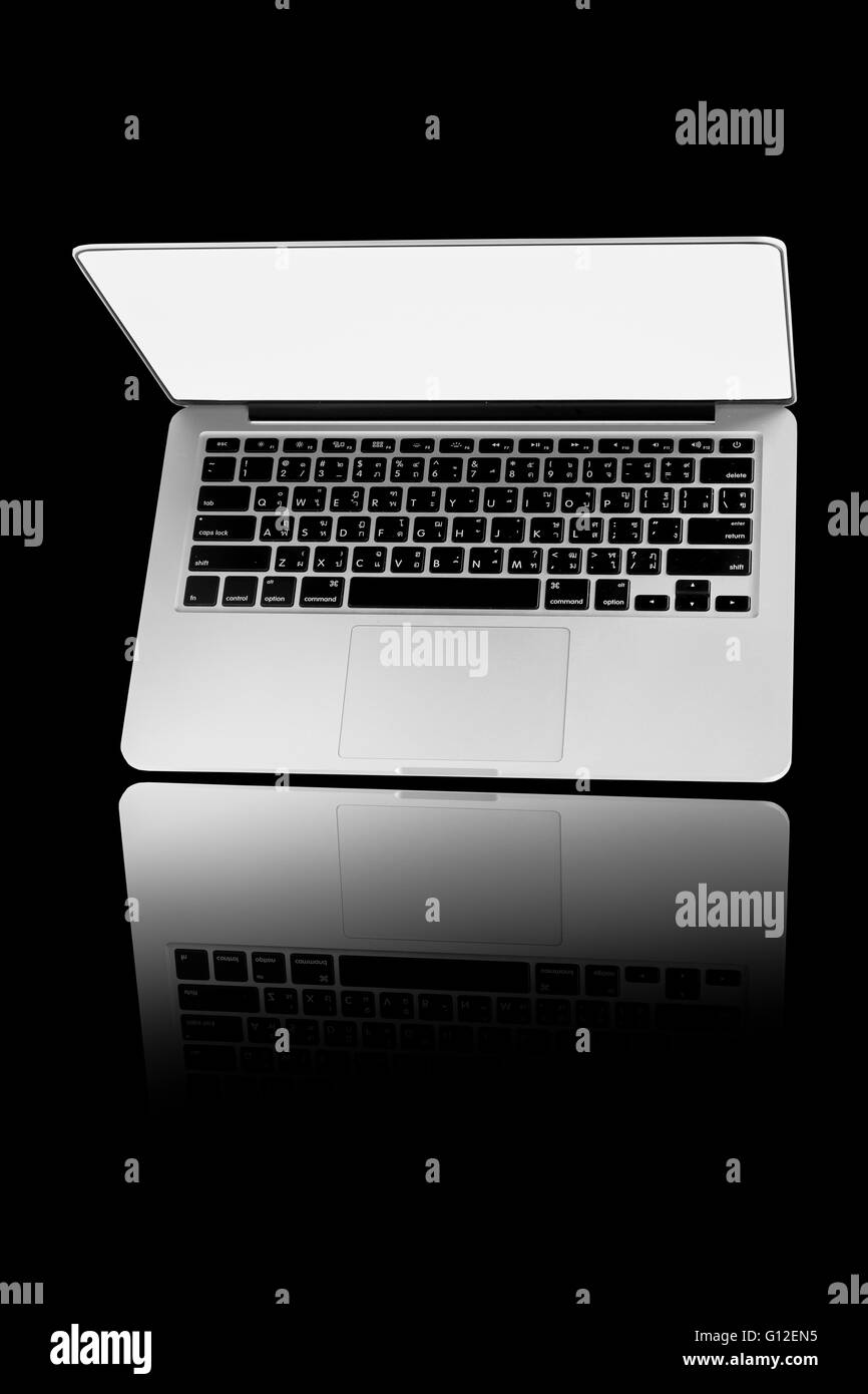 computer and internet concept: modern laptop or silver business ...