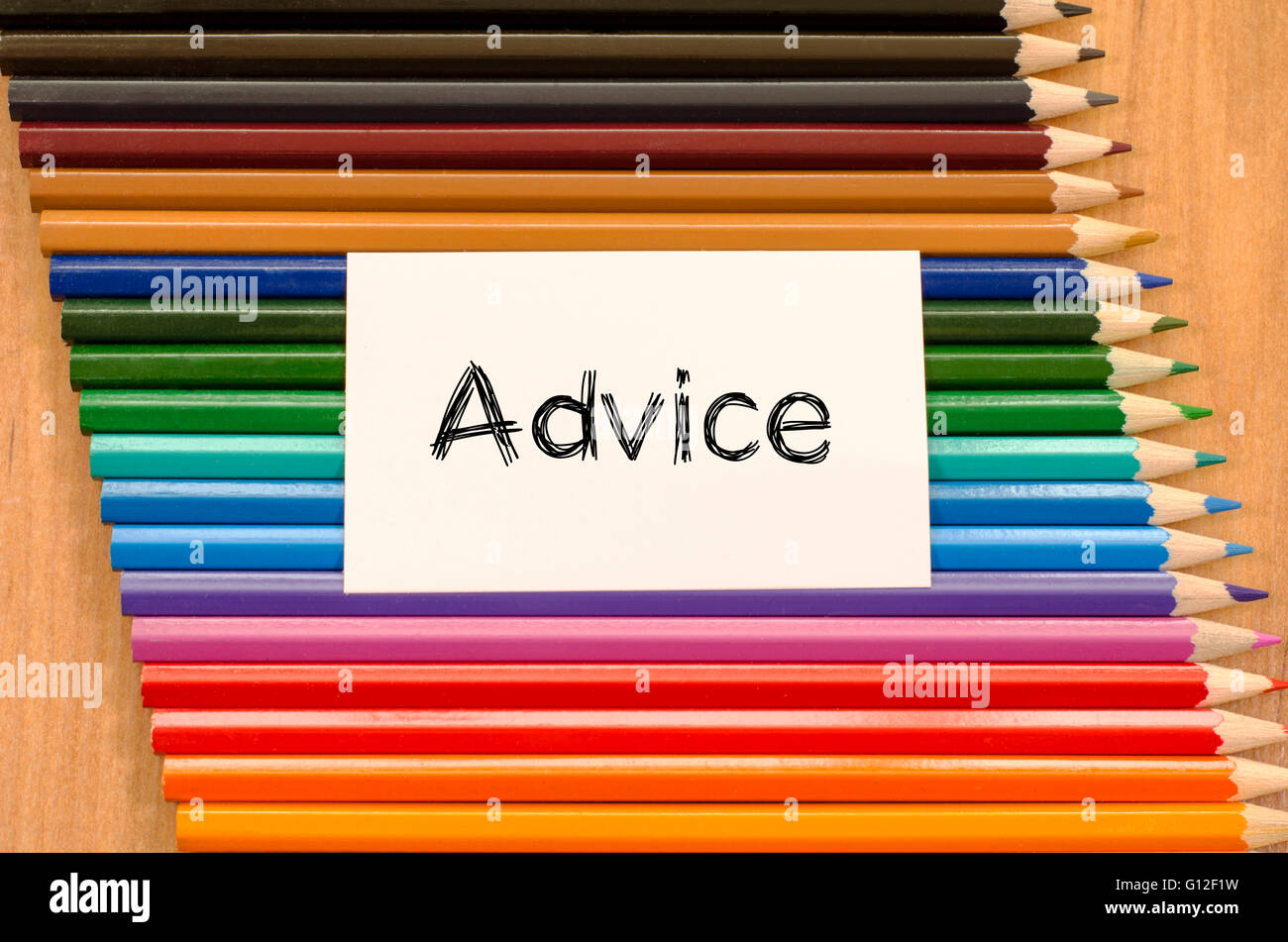 Advice text concept and colored pencil on wooden background Stock Photo ...