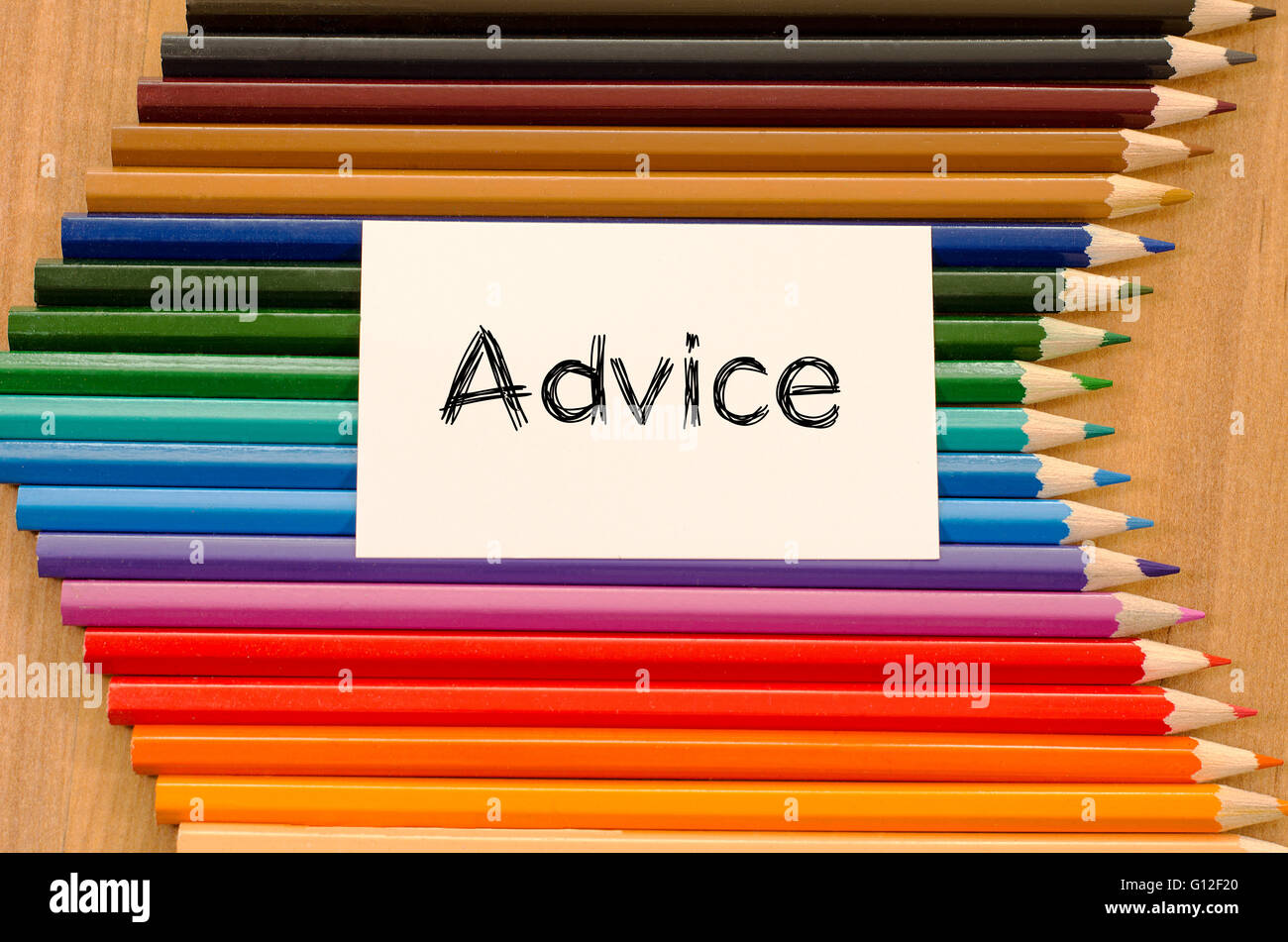 Advice text concept and colored pencil on wooden background Stock Photo ...