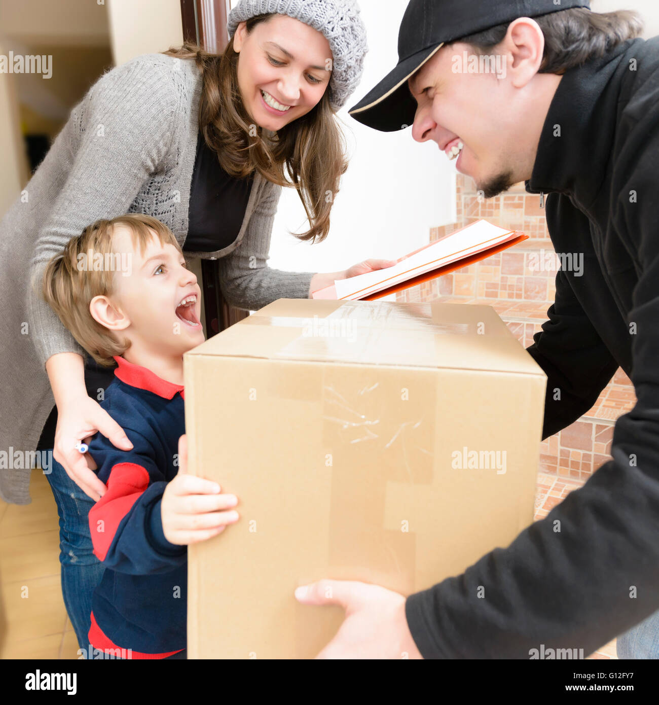 Boy with package hi-res stock photography and images - Alamy