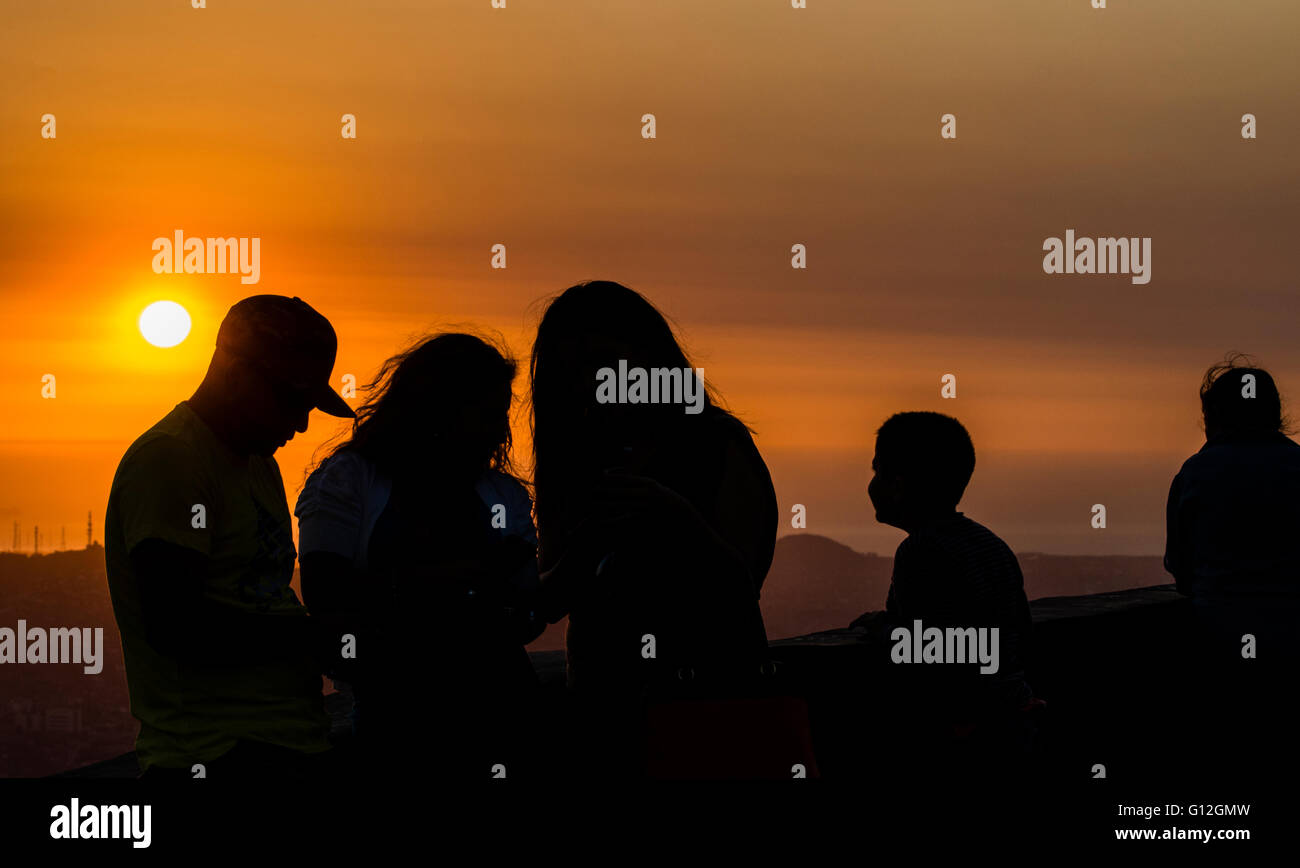 People in the sunset Stock Photo - Alamy