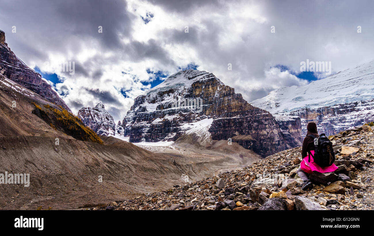 Woman Hiker enjoying the View of Mount Lefroy and Mount Victoria from ...