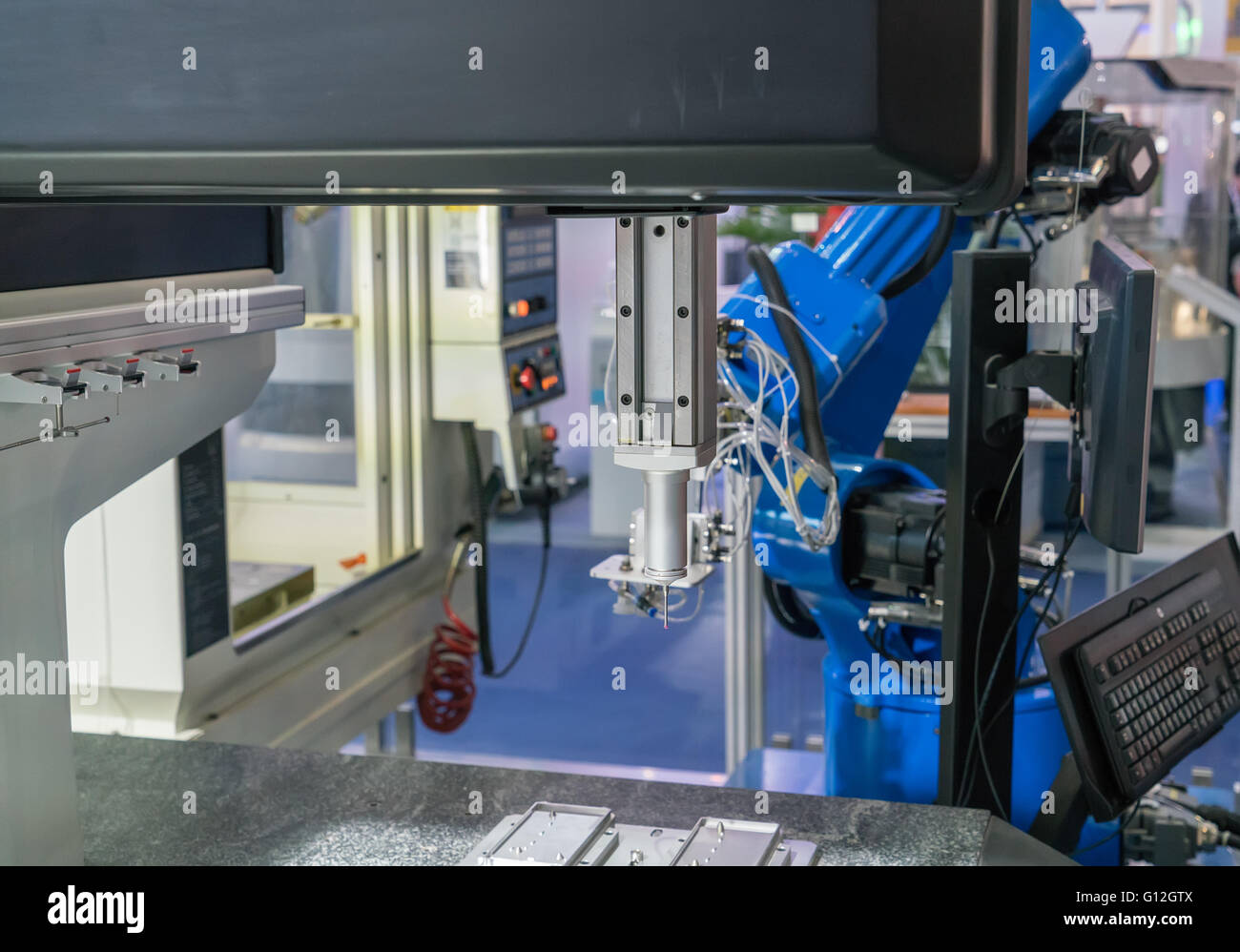 robotic hand machine tool at industrial manufacture factory Stock Photo ...