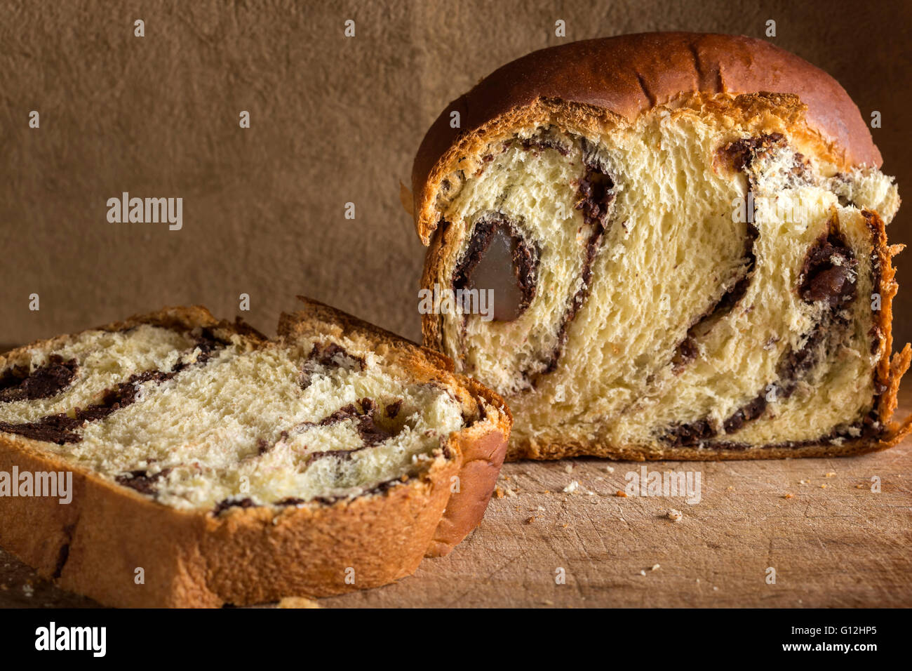 Romanian traditional sponge cake - Cozonac over wooden background Stock ...