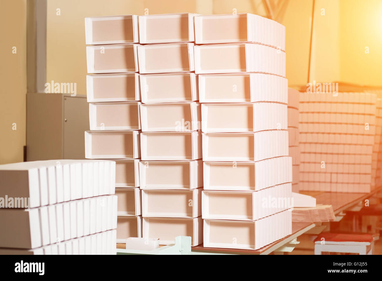 Stacks of empty white boxes Stock Photo - Alamy