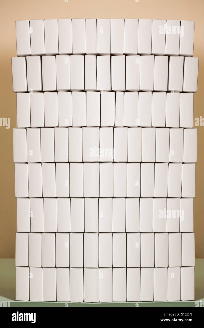 Huge stack of white boxes Stock Photo - Alamy