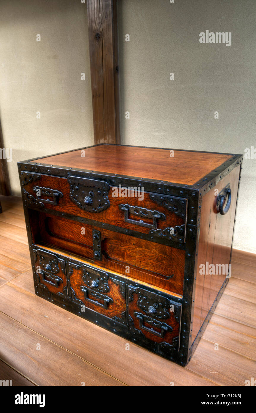 Traditional japanese ornated wooden brown chest Stock Photo - Alamy