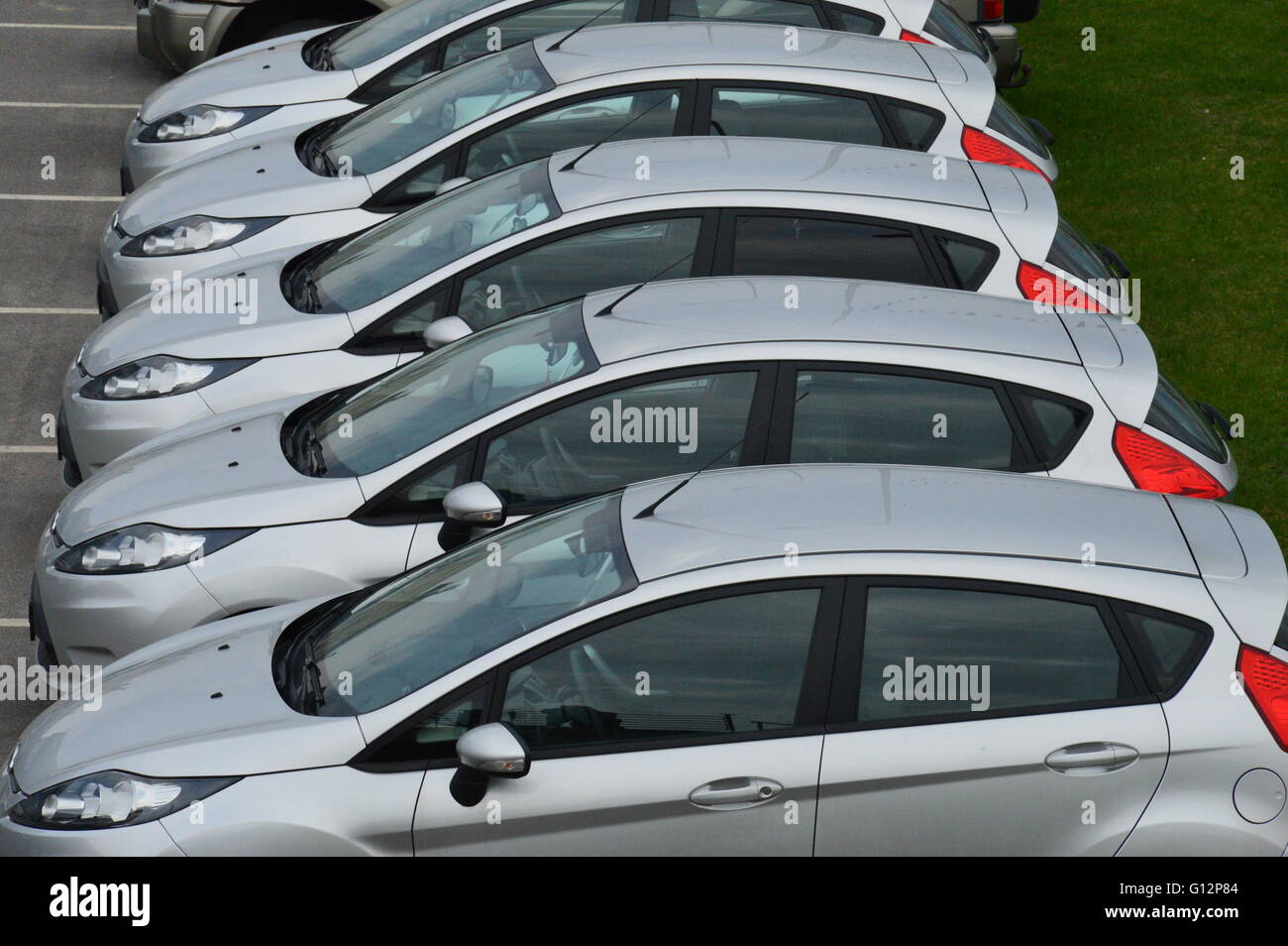 Row of cars Stock Photo - Alamy