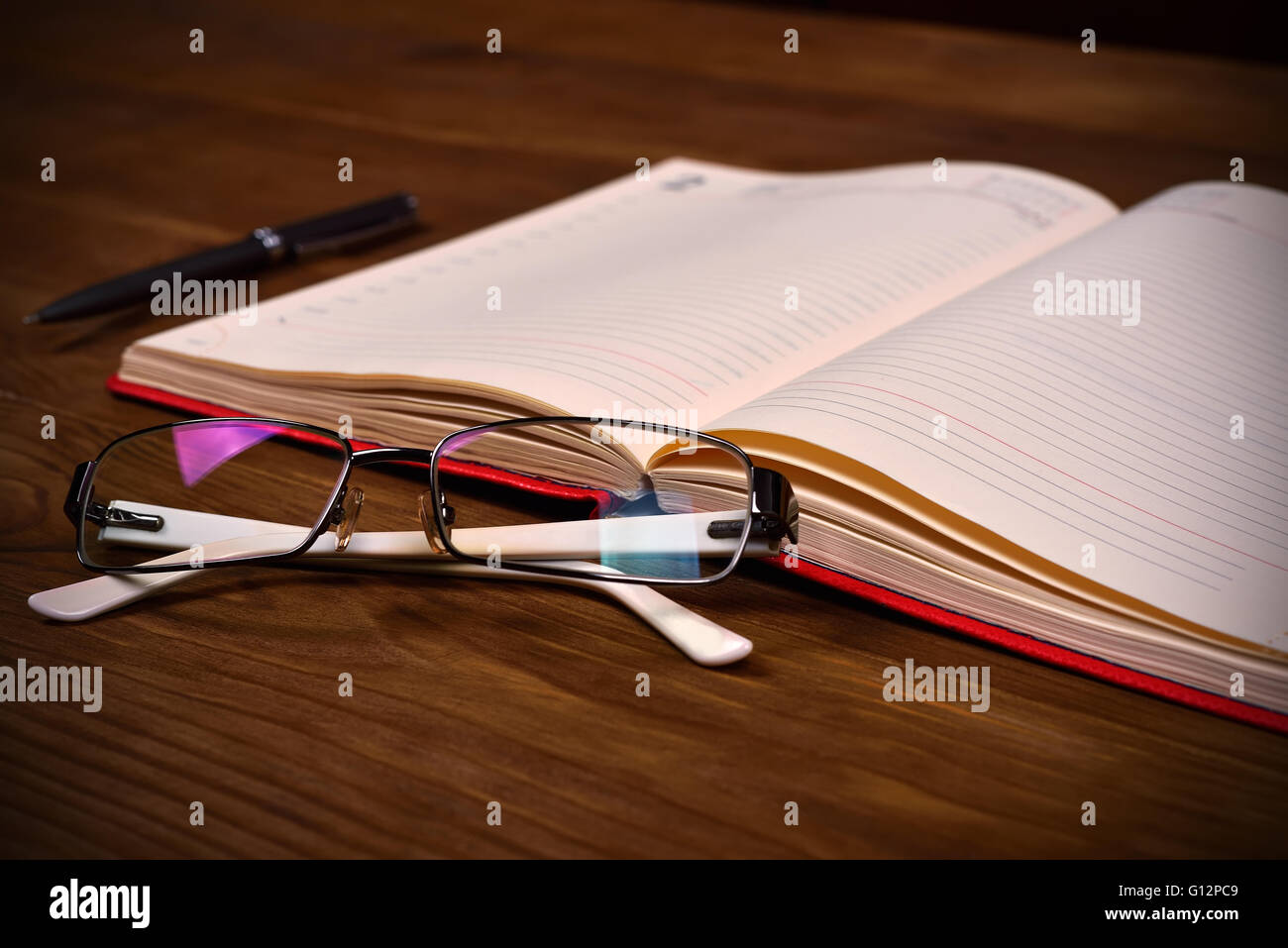 Open diary pen red hi-res stock photography and images - Alamy