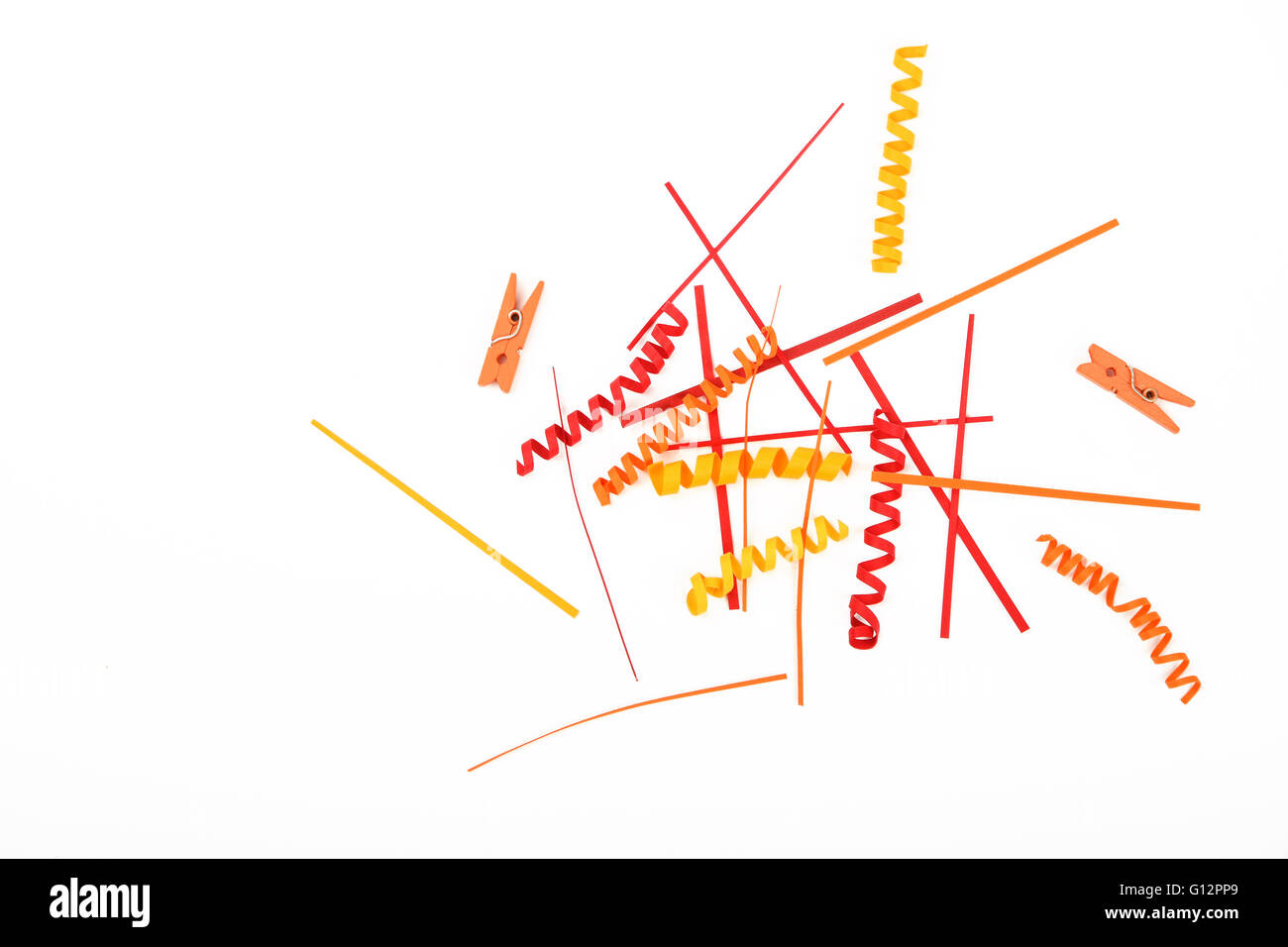 Small things matter, mixed colorful red and yellow paper pieces and ...