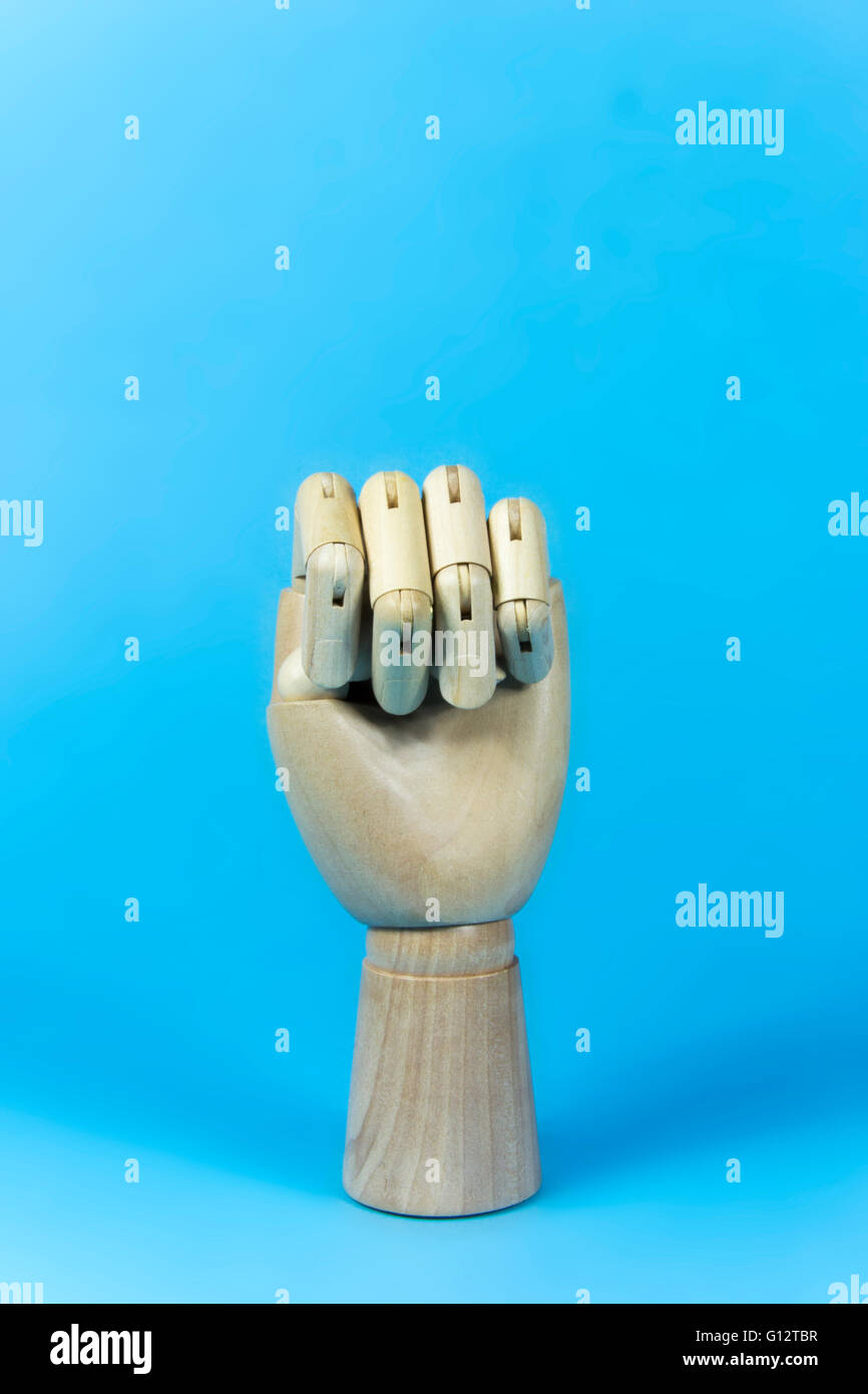 hand wood, wooden hand, zero fingers, blue background Stock Photo - Alamy