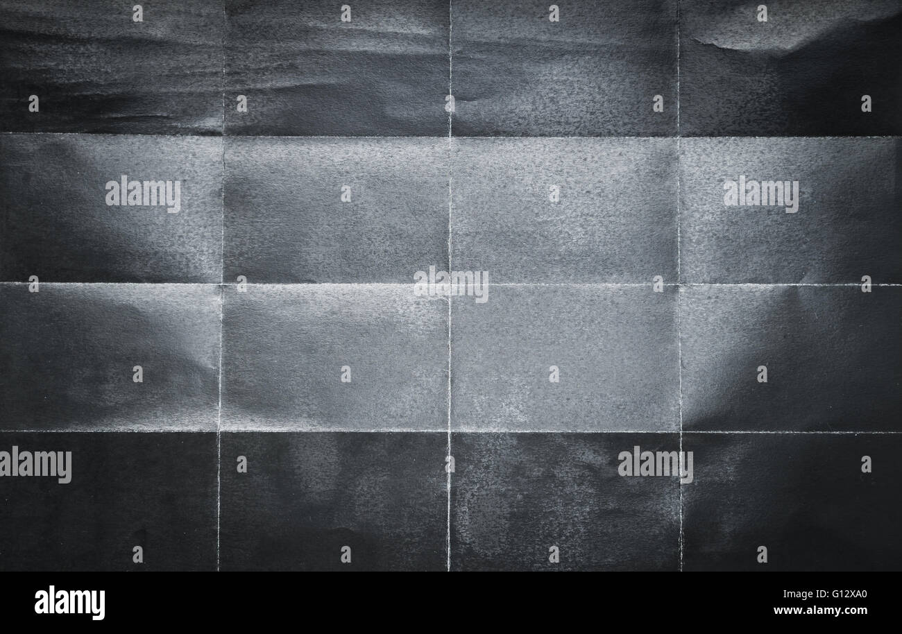 Background pattern of folded black paper in 16 parts Stock Photo - Alamy