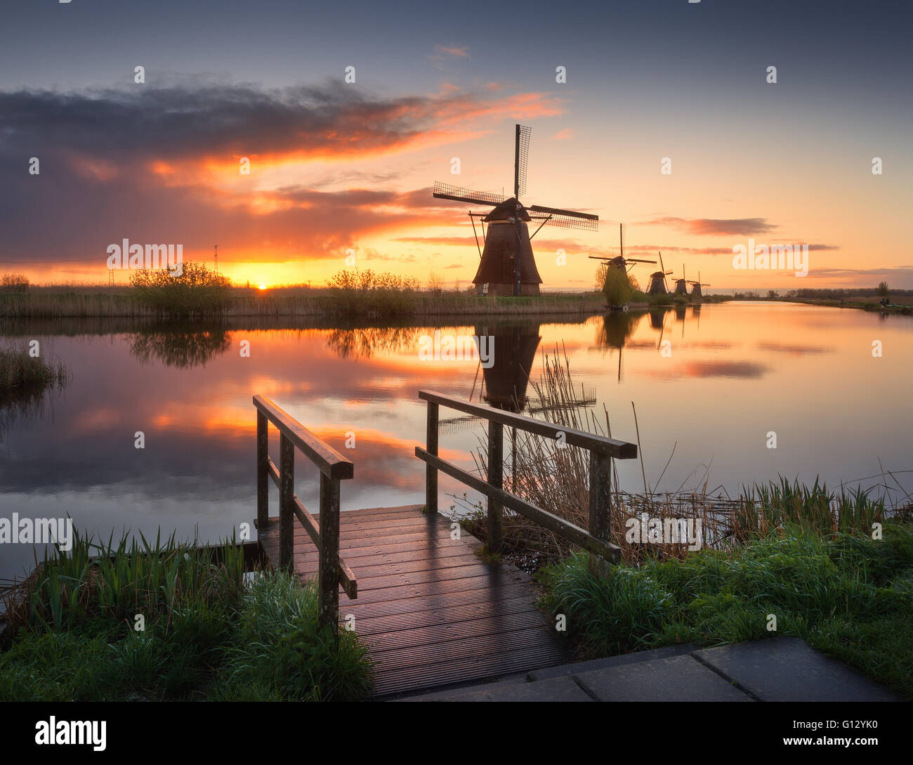 Landscape with beautiful traditional dutch windmills near the water ...
