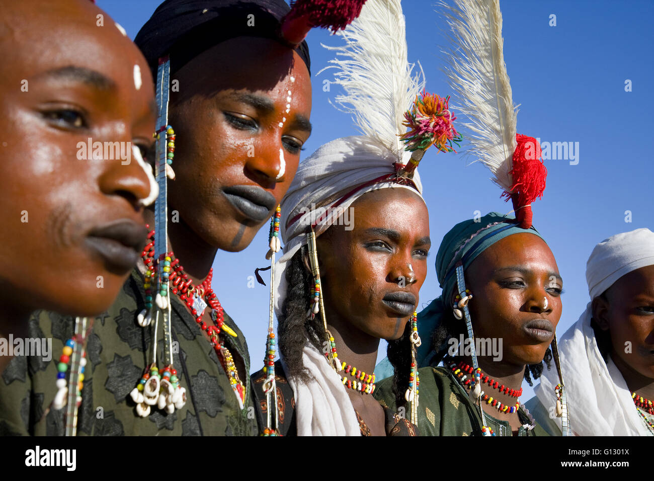 A Wodaabe-Bororo man with his face painted for the annual Gerewol ...