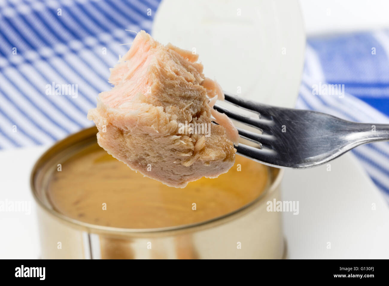 piece of canned tuna in olive oil just for eating. As a background one ...