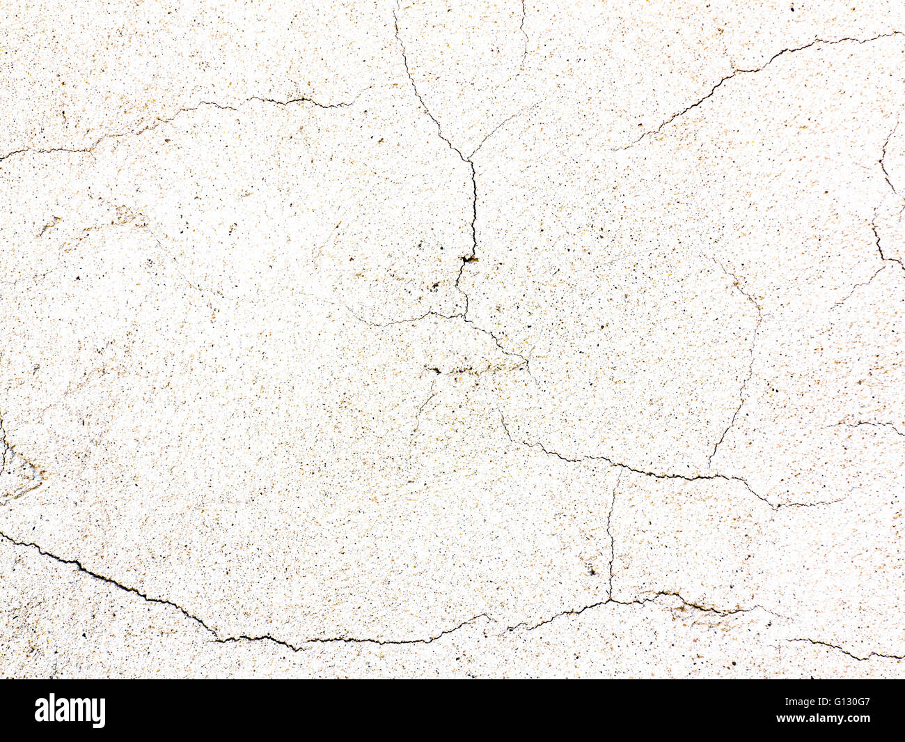 Cracked surface of rough plaster - fine cracks and scratches on the ...