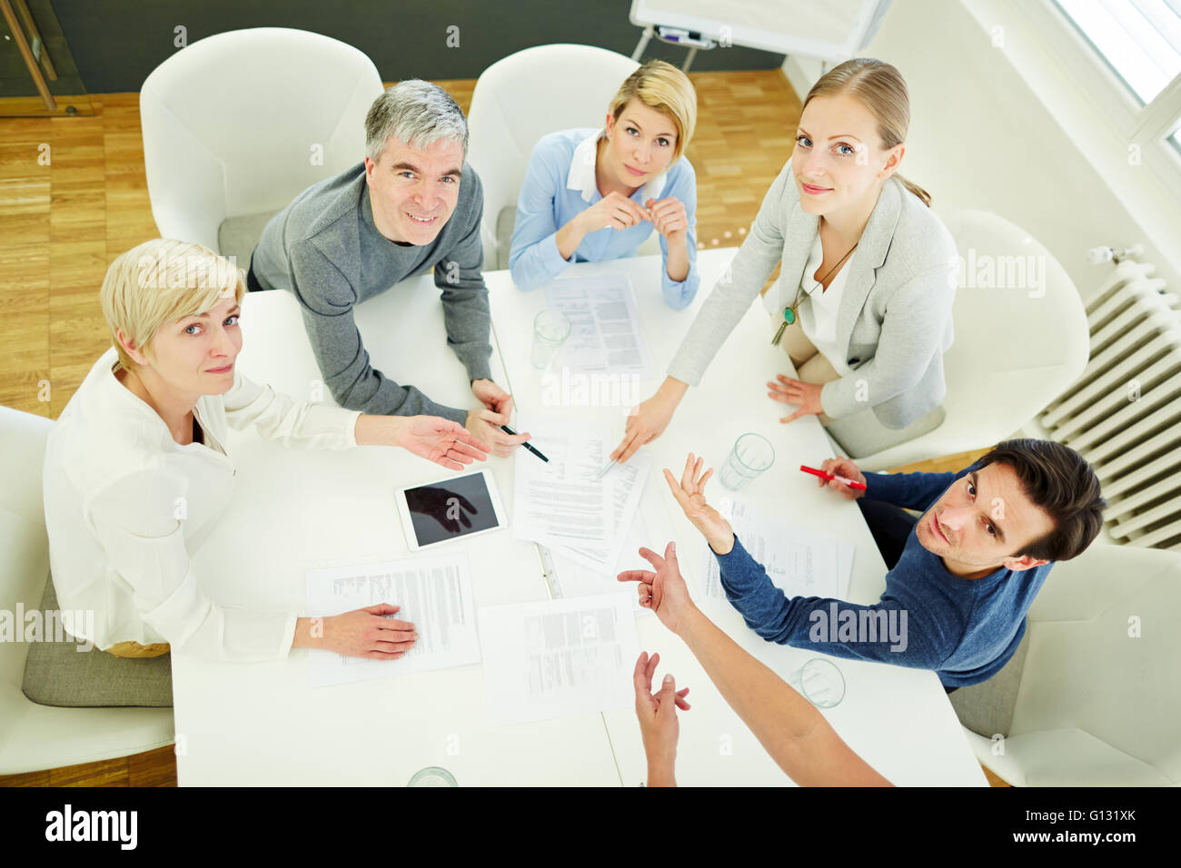 Business people meeting around table hi-res stock photography and ...