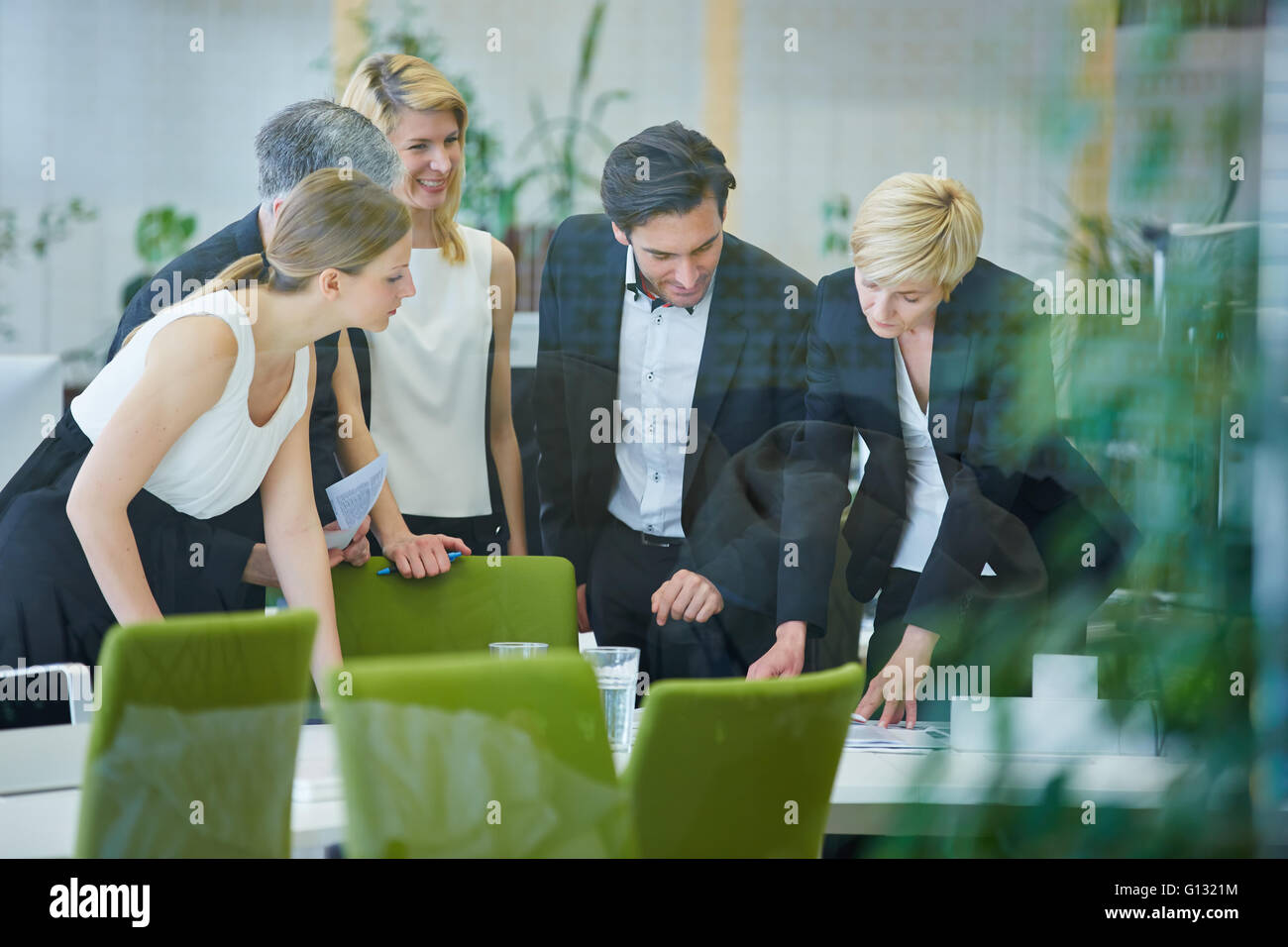 Successful business team doing planning in office meeting Stock Photo ...