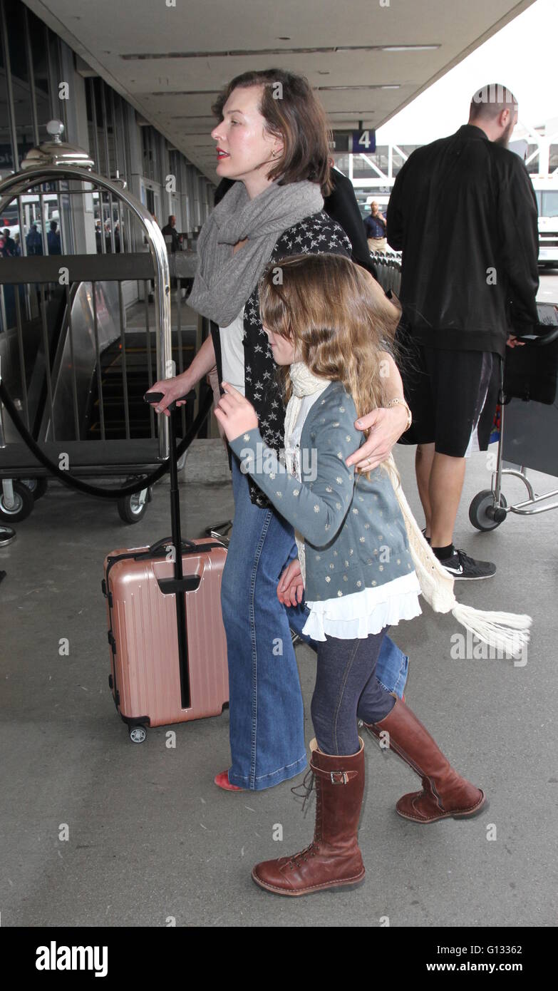 Milla Jovovich with Paul W. S. Anderson and daughter Ever Gabo Anderson ...