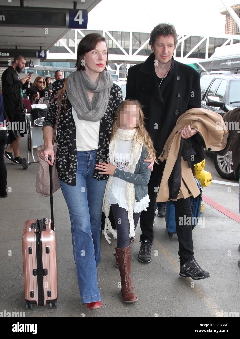 Milla Jovovich with Paul W. S. Anderson and daughter Ever Gabo Anderson ...