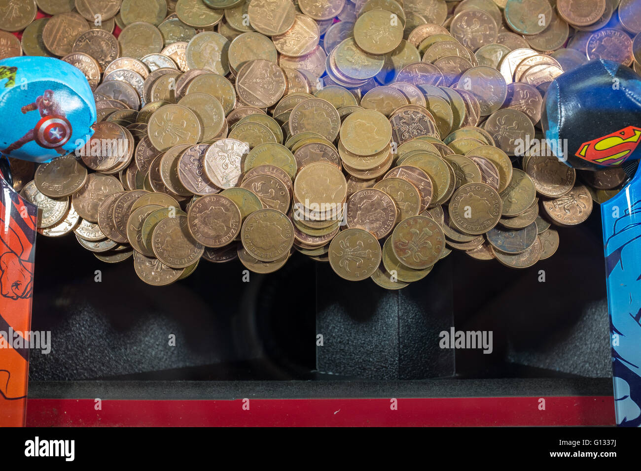 Coin pusher arcade game hi-res stock photography and images - Alamy