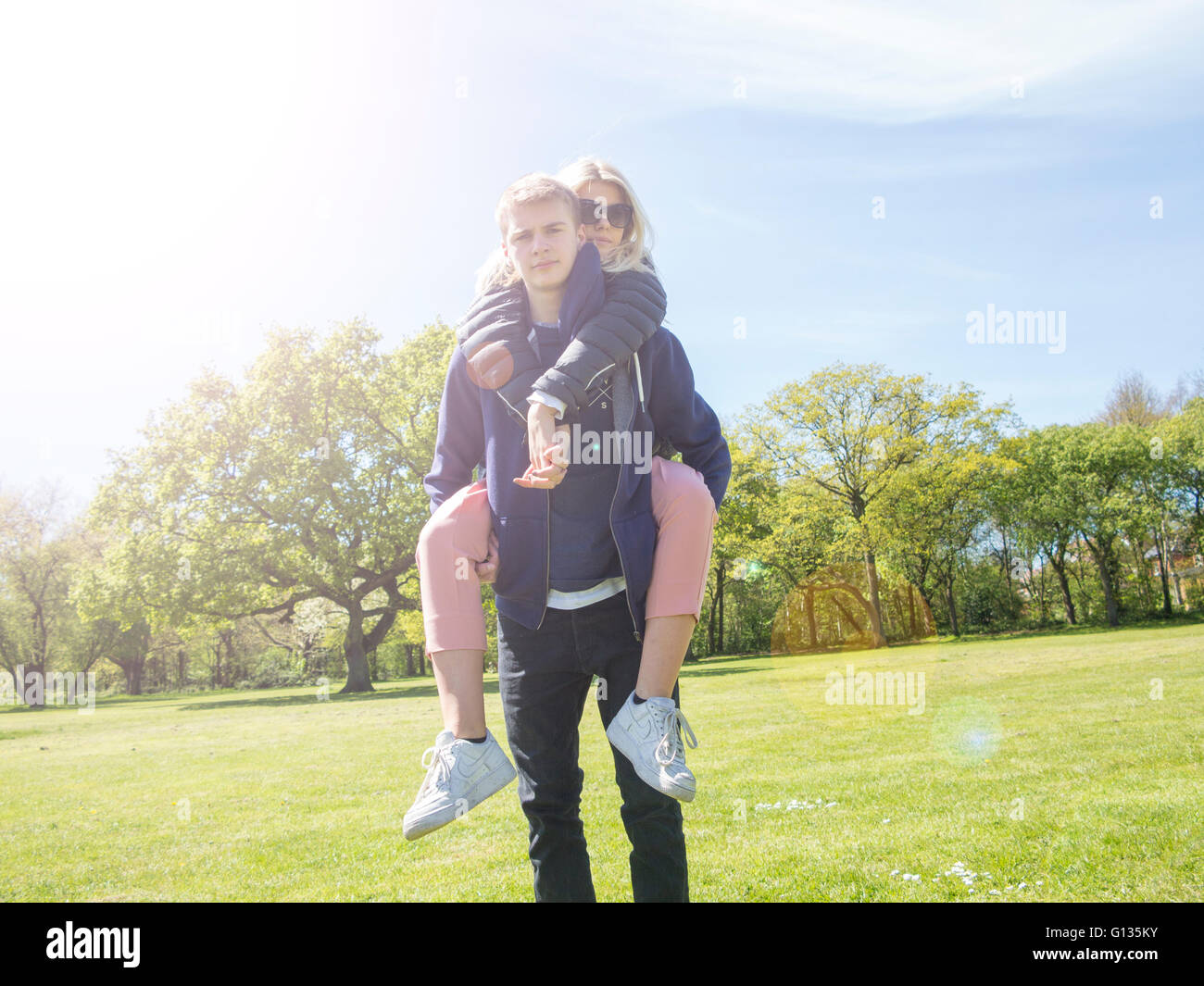 Boy piggy back girl hi-res stock photography and images - Alamy
