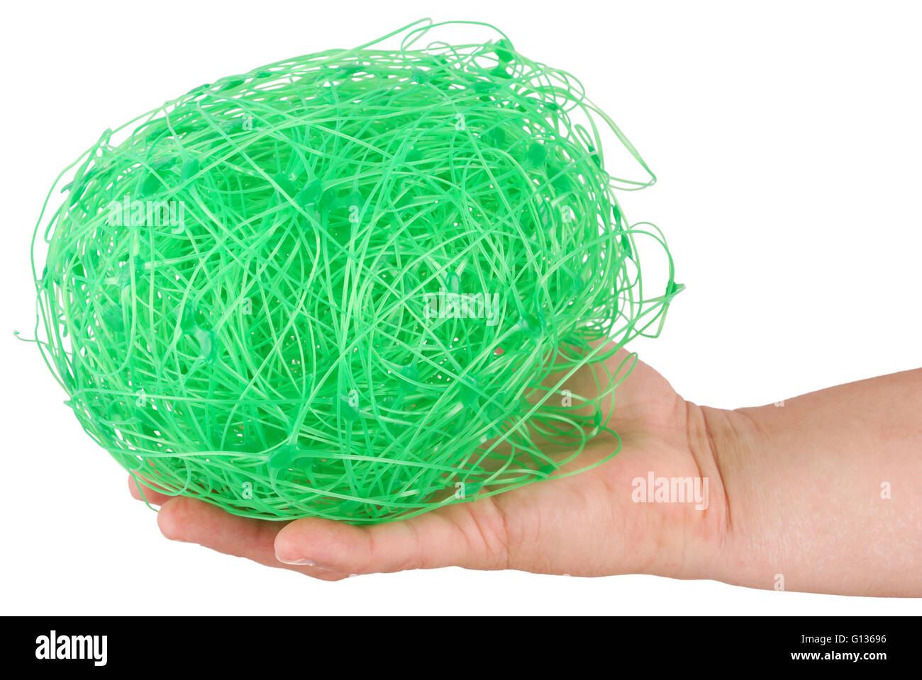 Green garden grid on the hand isolated on white Stock Photo - Alamy