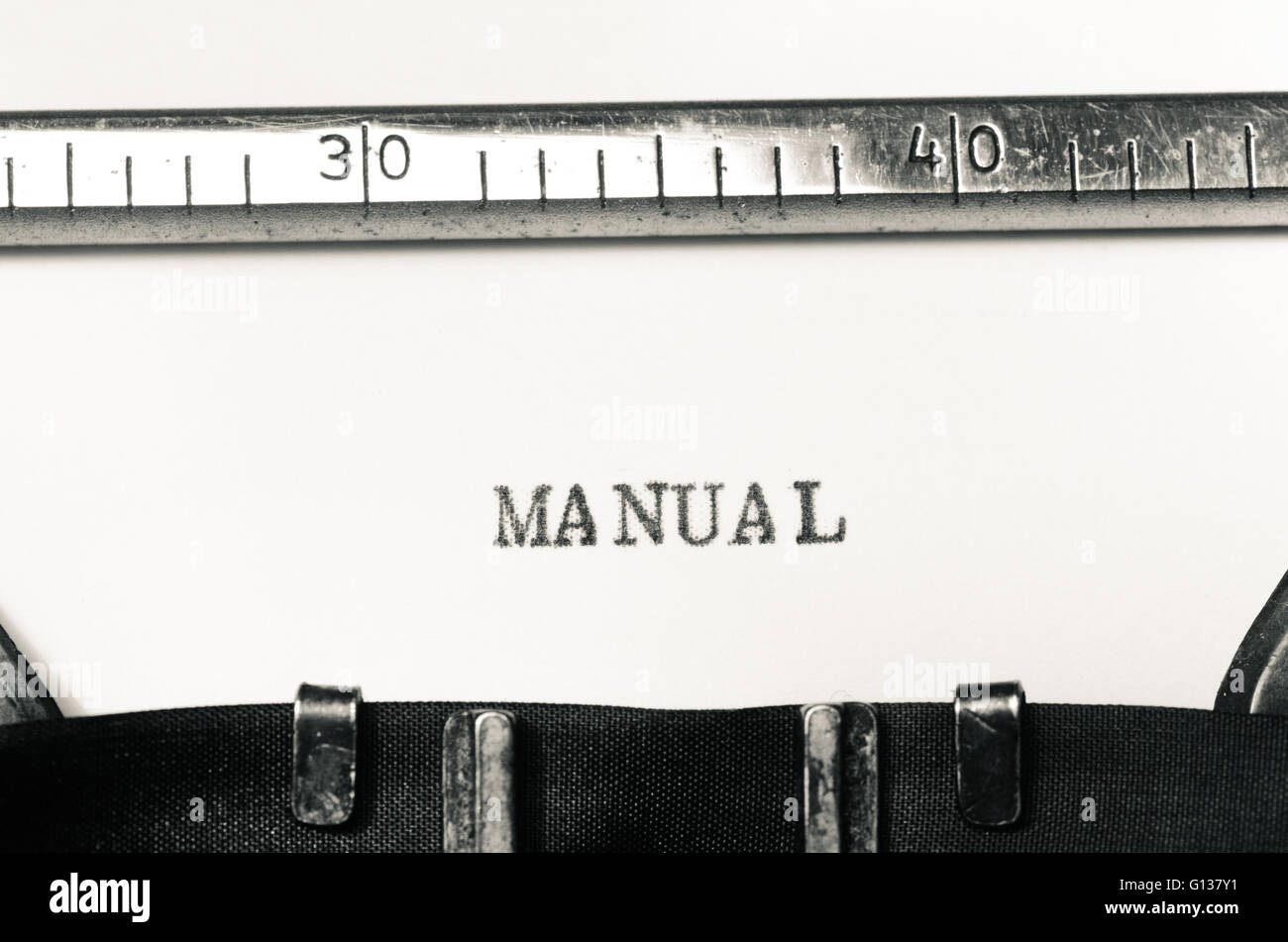 word manual typed on an old typewriter Stock Photo - Alamy